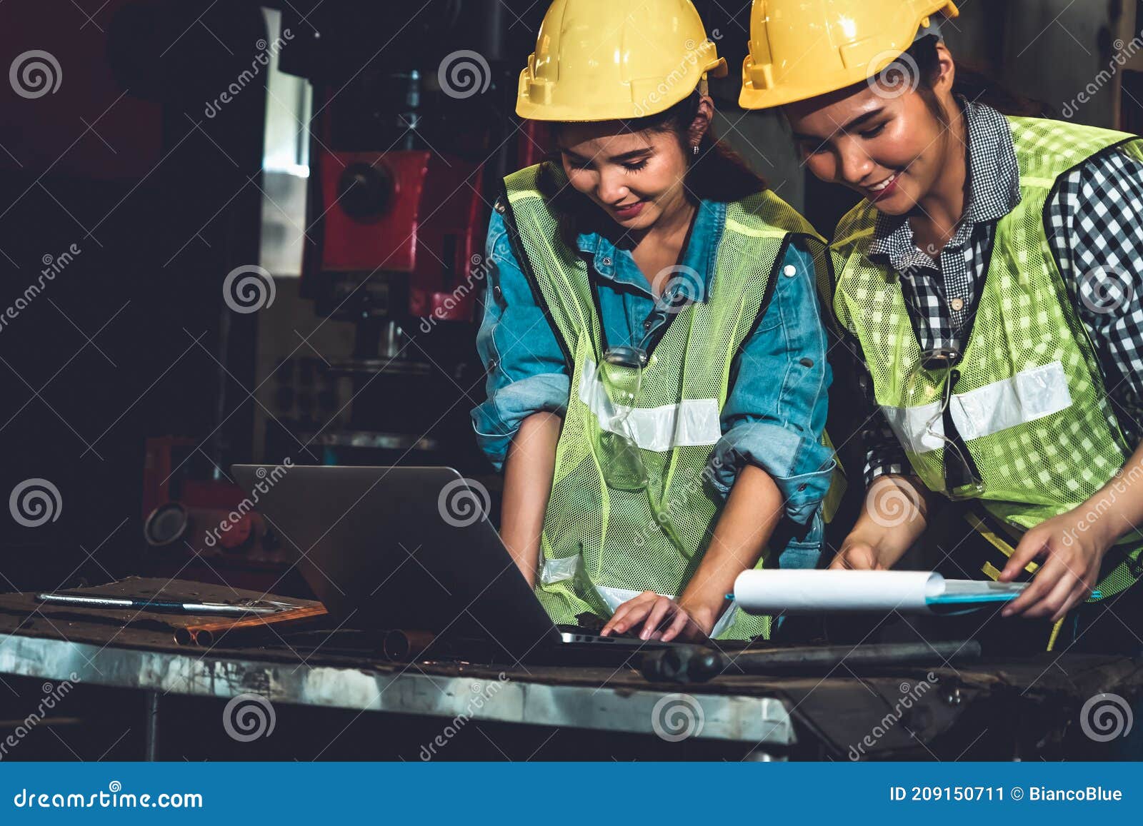 Factory Job Workers Working and Discussing Manufacturing Plan in the ...