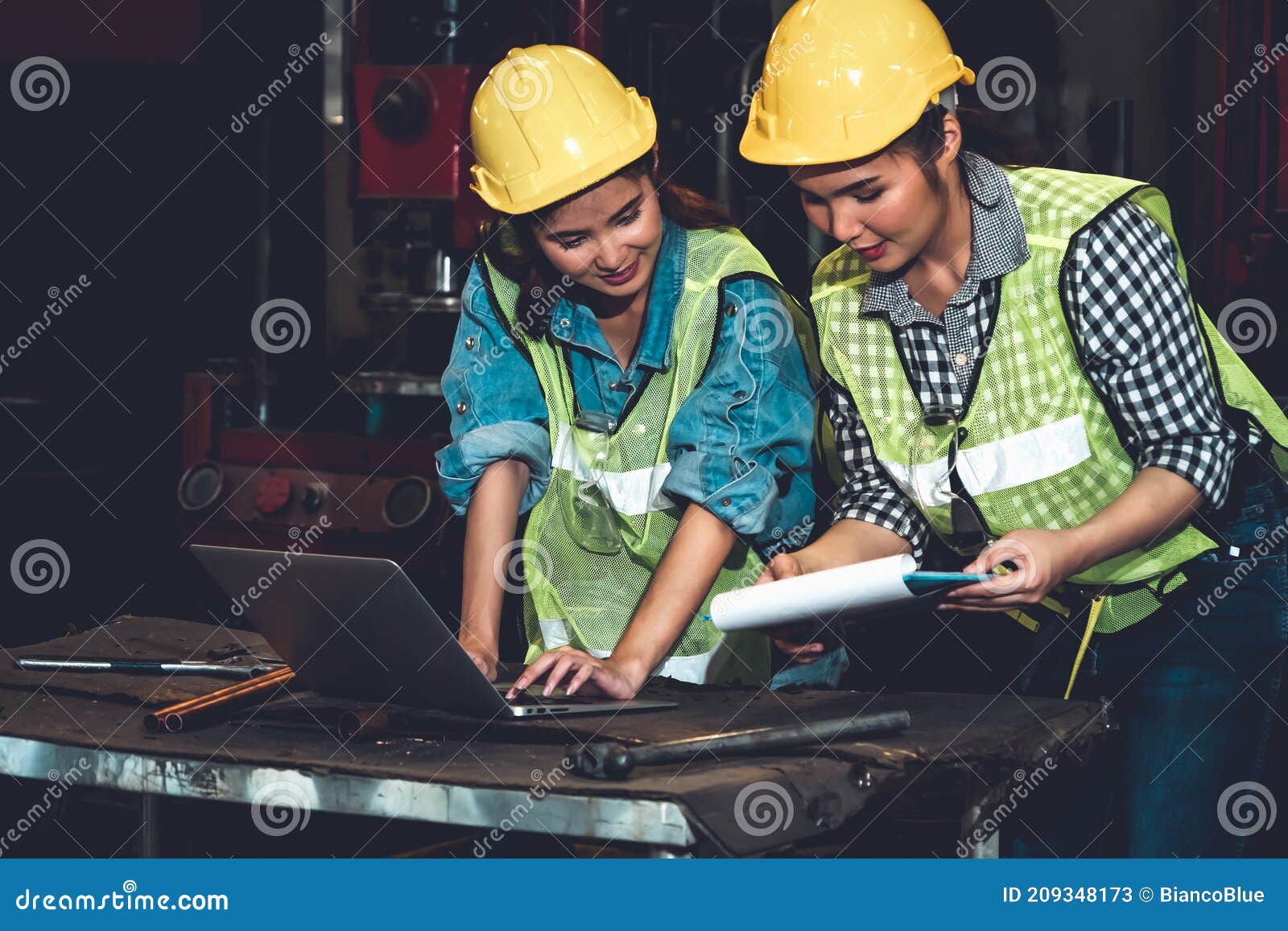 Factory Job Workers Working and Discussing Manufacturing Plan in the ...