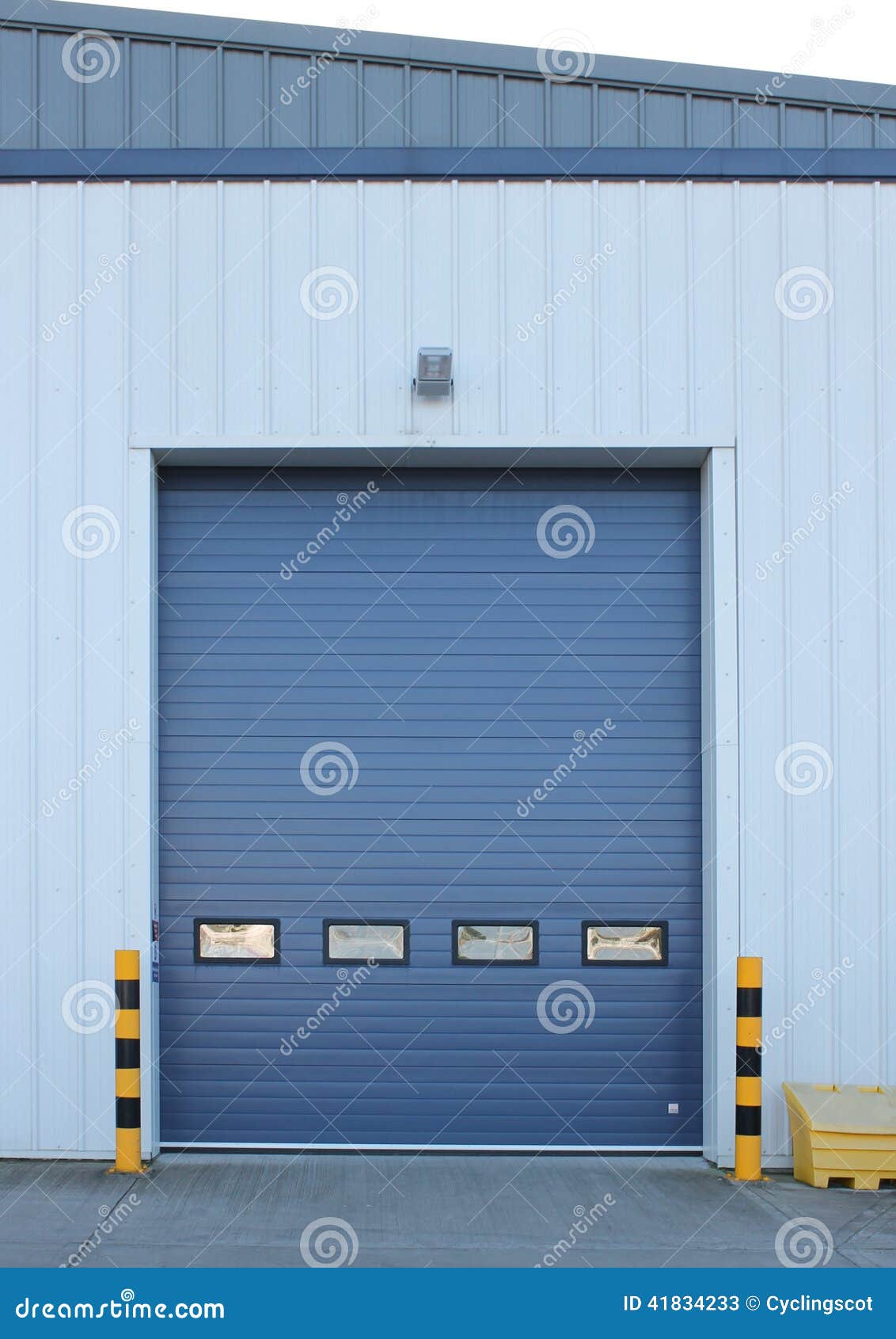 Factory Loading Bay Roller Door on Industrial Building Stock Image ...