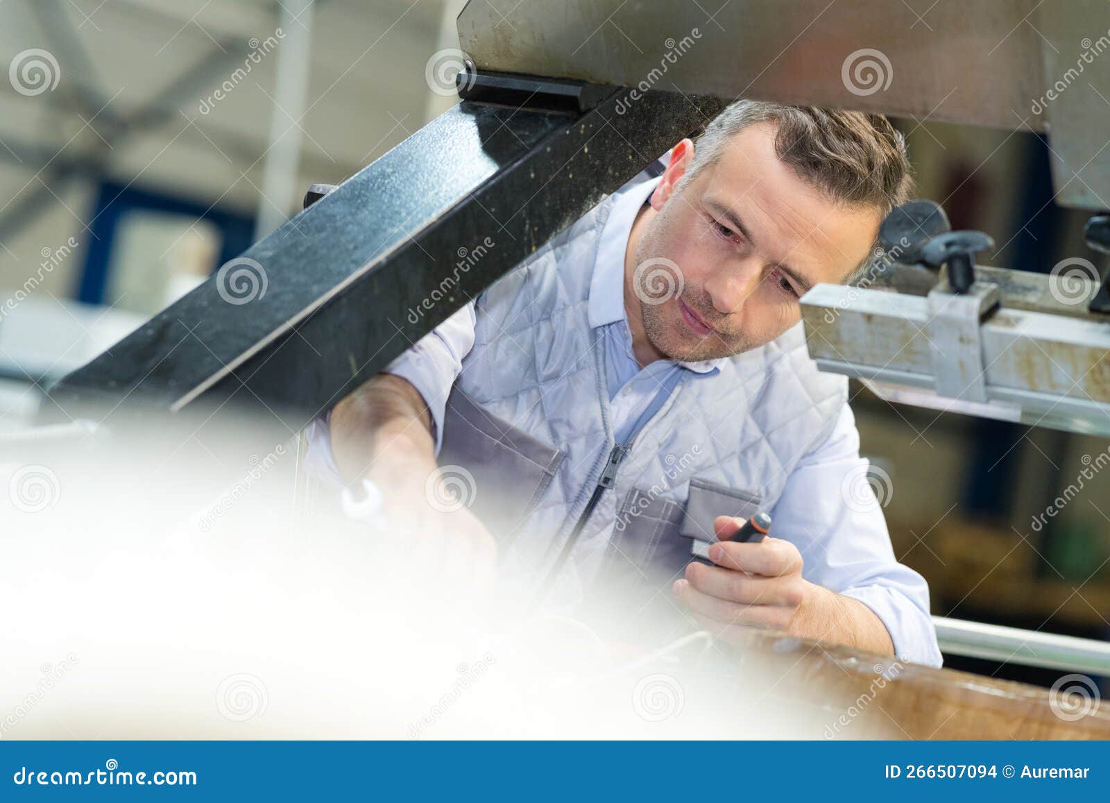 Factory Machine Operator at Work Stock Photo - Image of bend, operating ...