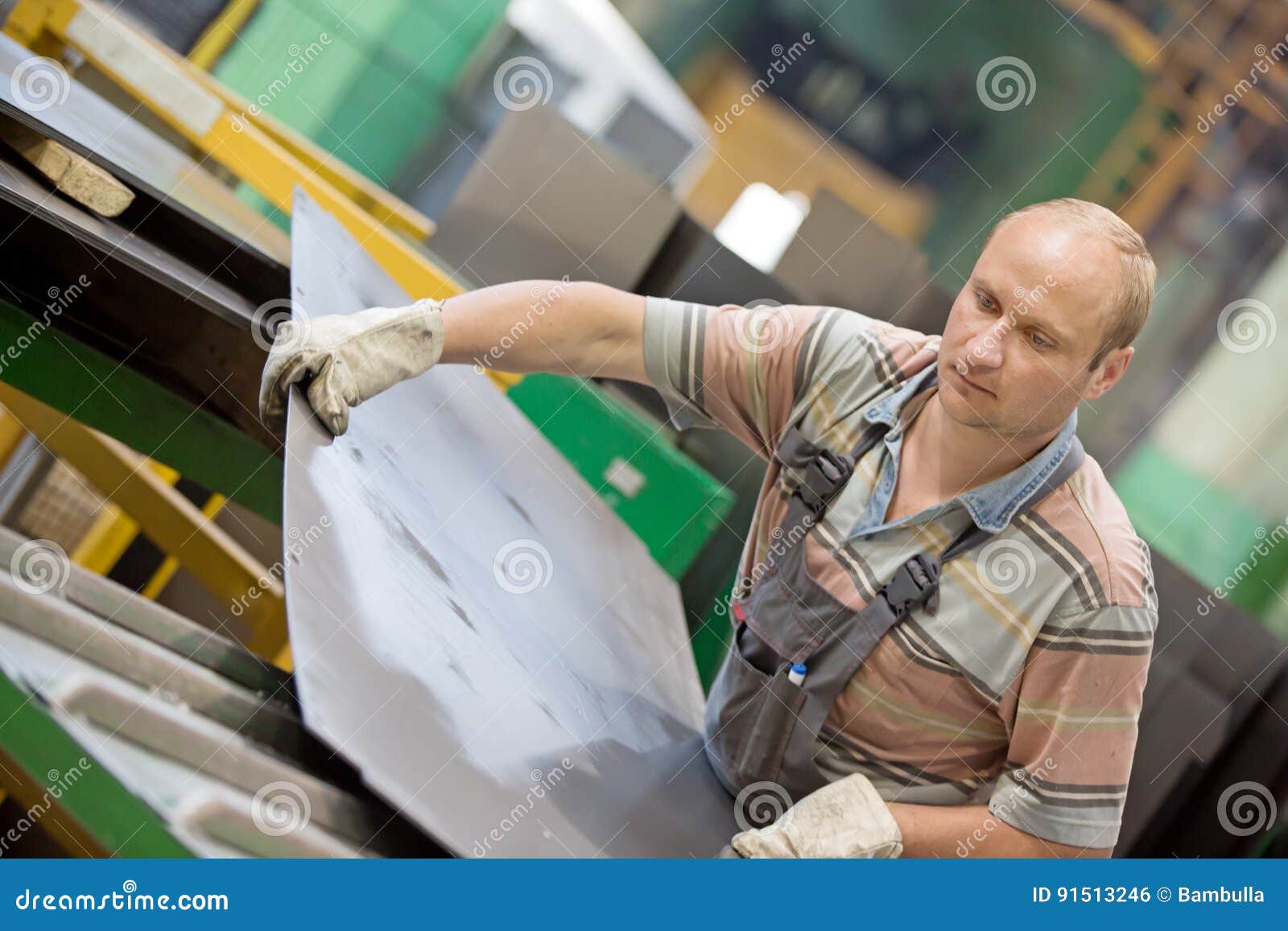 Factory Man Worker Moving Metal Sheet in Workshop Stock Photo - Image ...