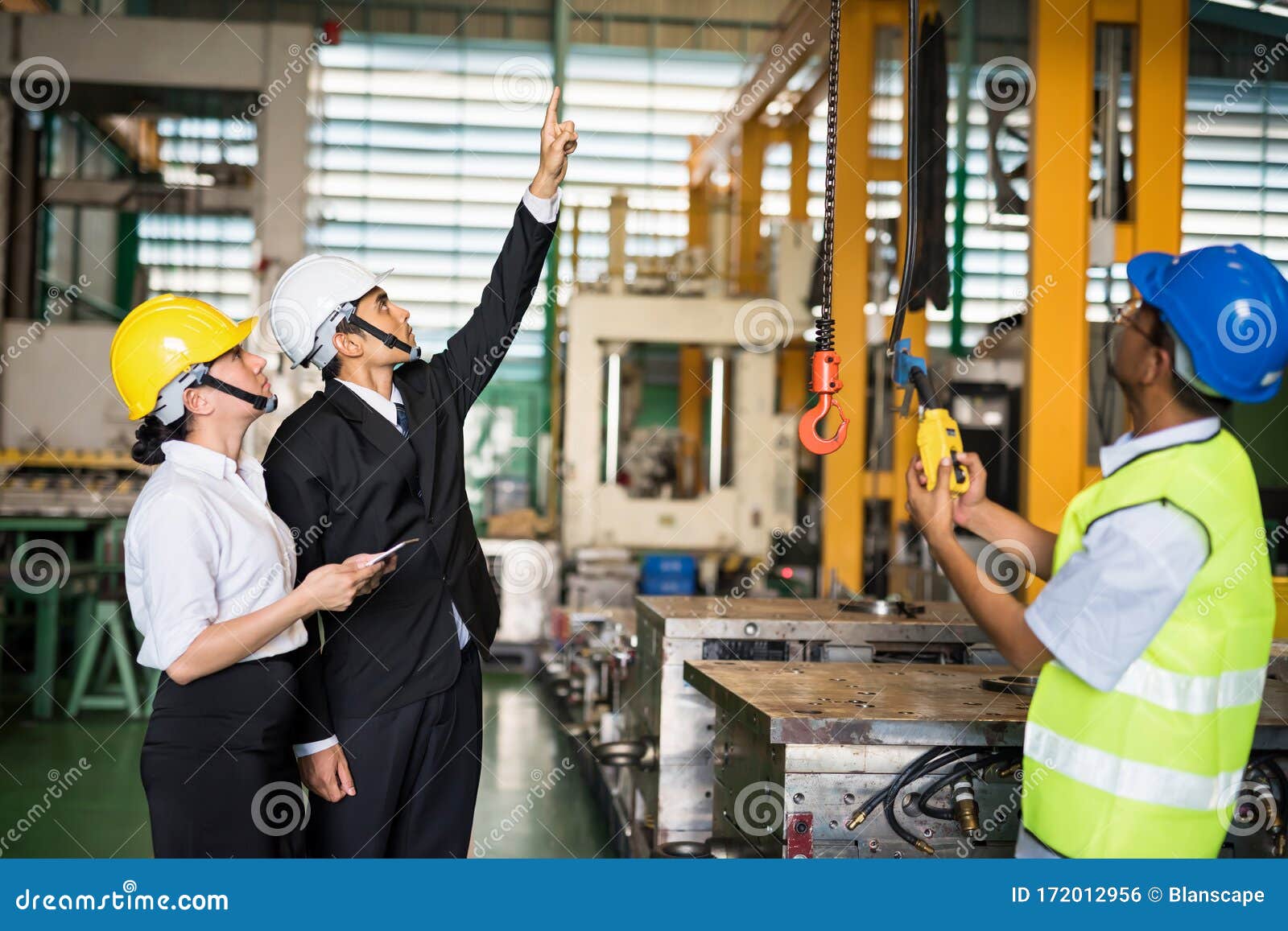 Factory Manager Command Lifting Crane in Warehouse Stock Photo - Image ...