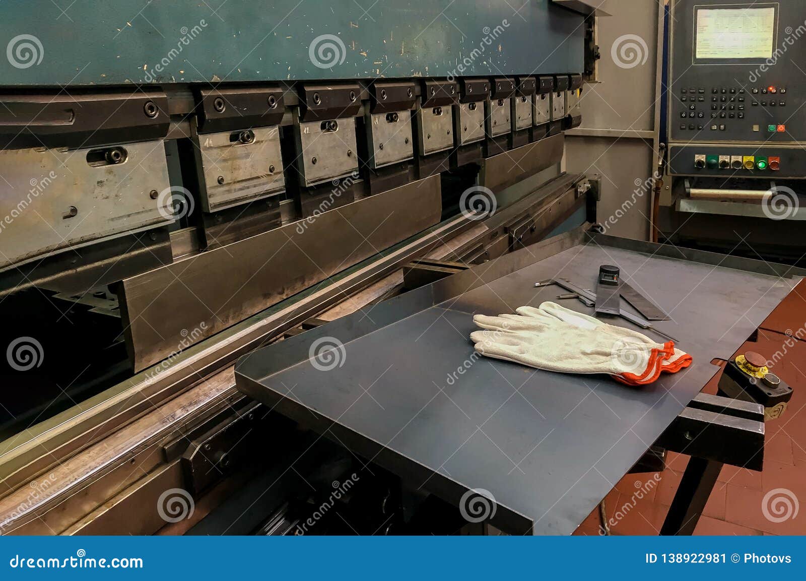 Factory at Metal Skip Machine Putting Work Piece in with Sheet Metal ...