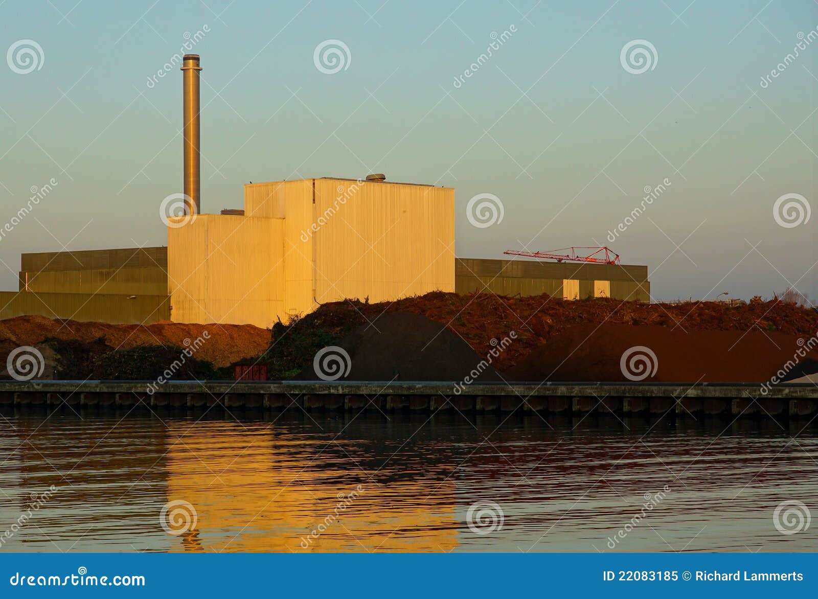 Factory near the river stock image. Image of technology - 22083185