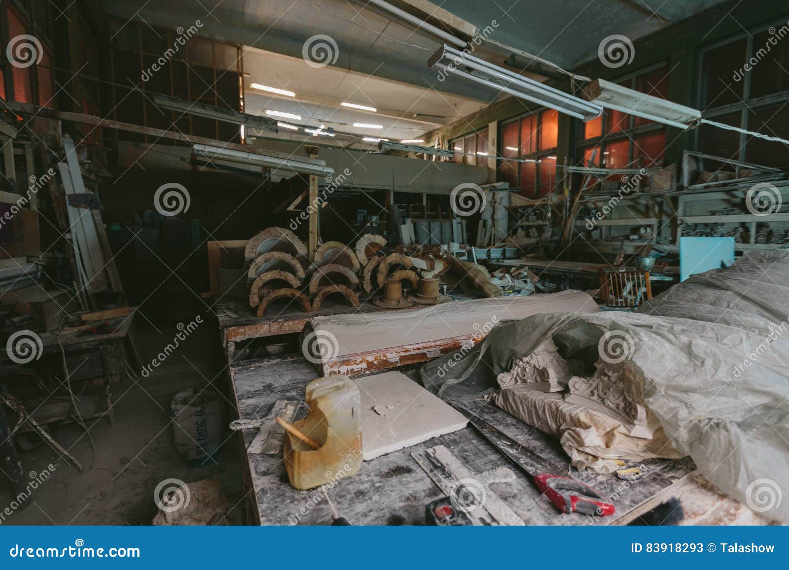 Factory for Production of Plaster Molds. Cluttered Dusty Old Warehouse ...
