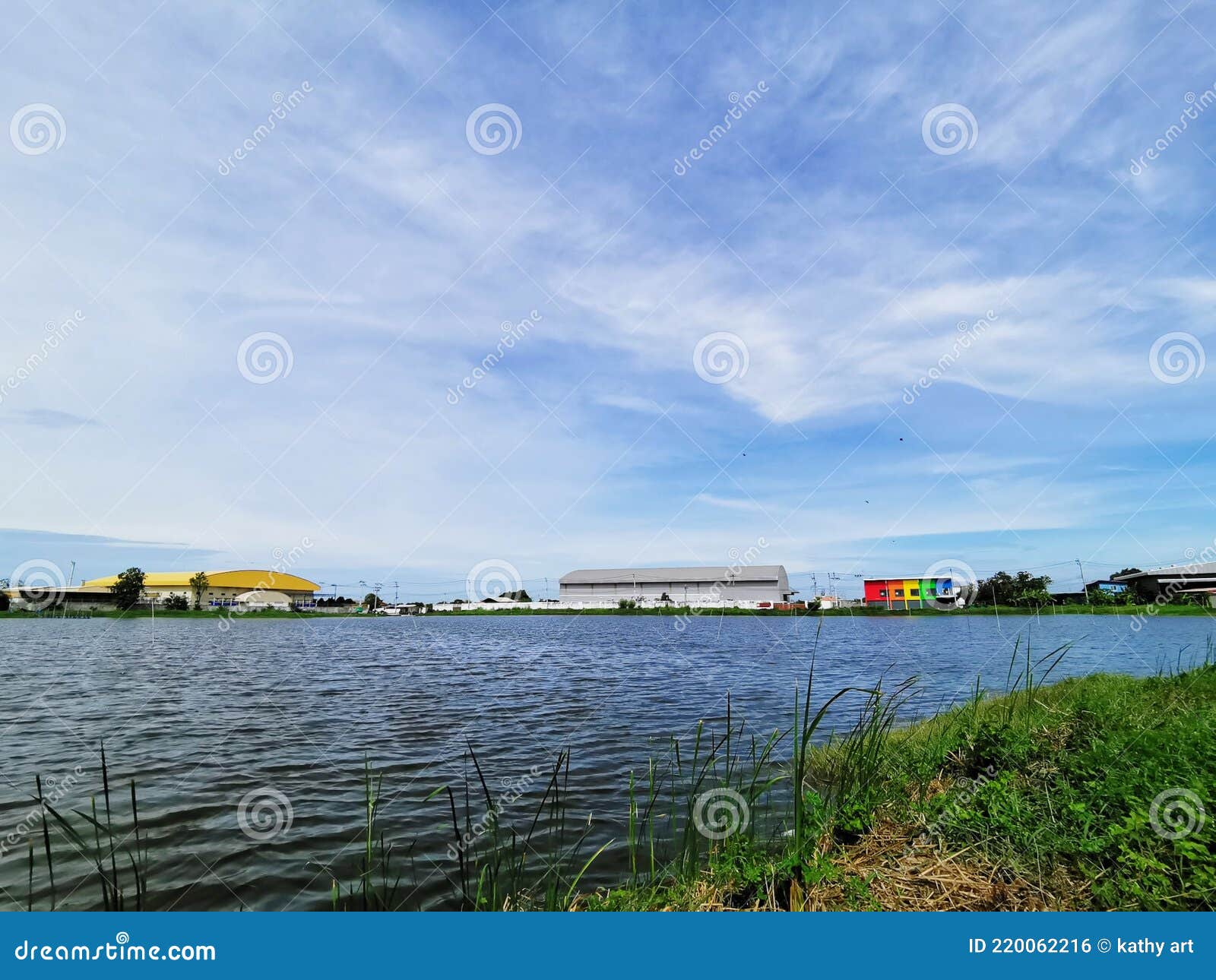 Factory on the river stock photo. Image of shore, reservoir - 220062216