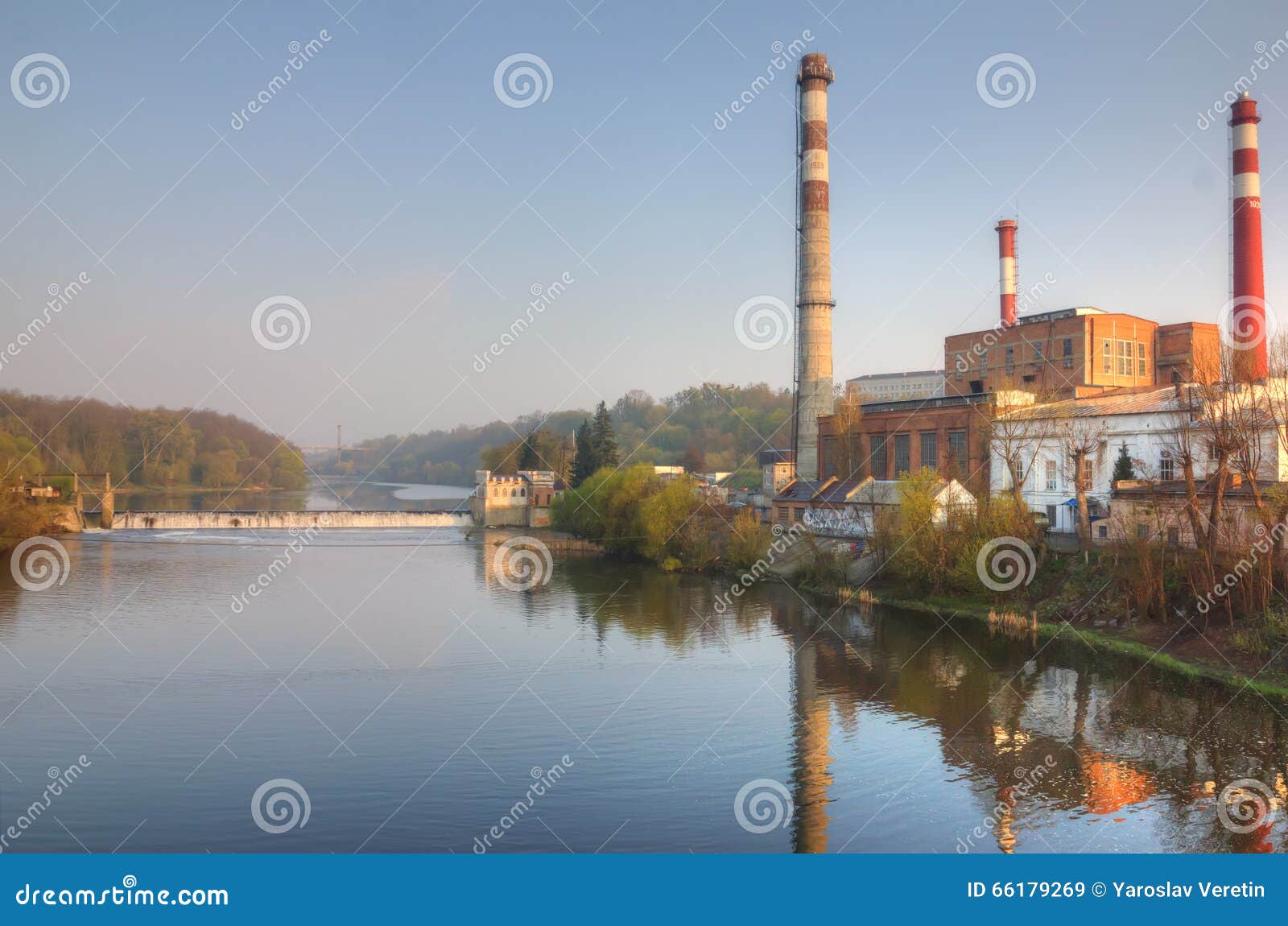 Factory at river dam stock image. Image of plant, bridge - 66179269