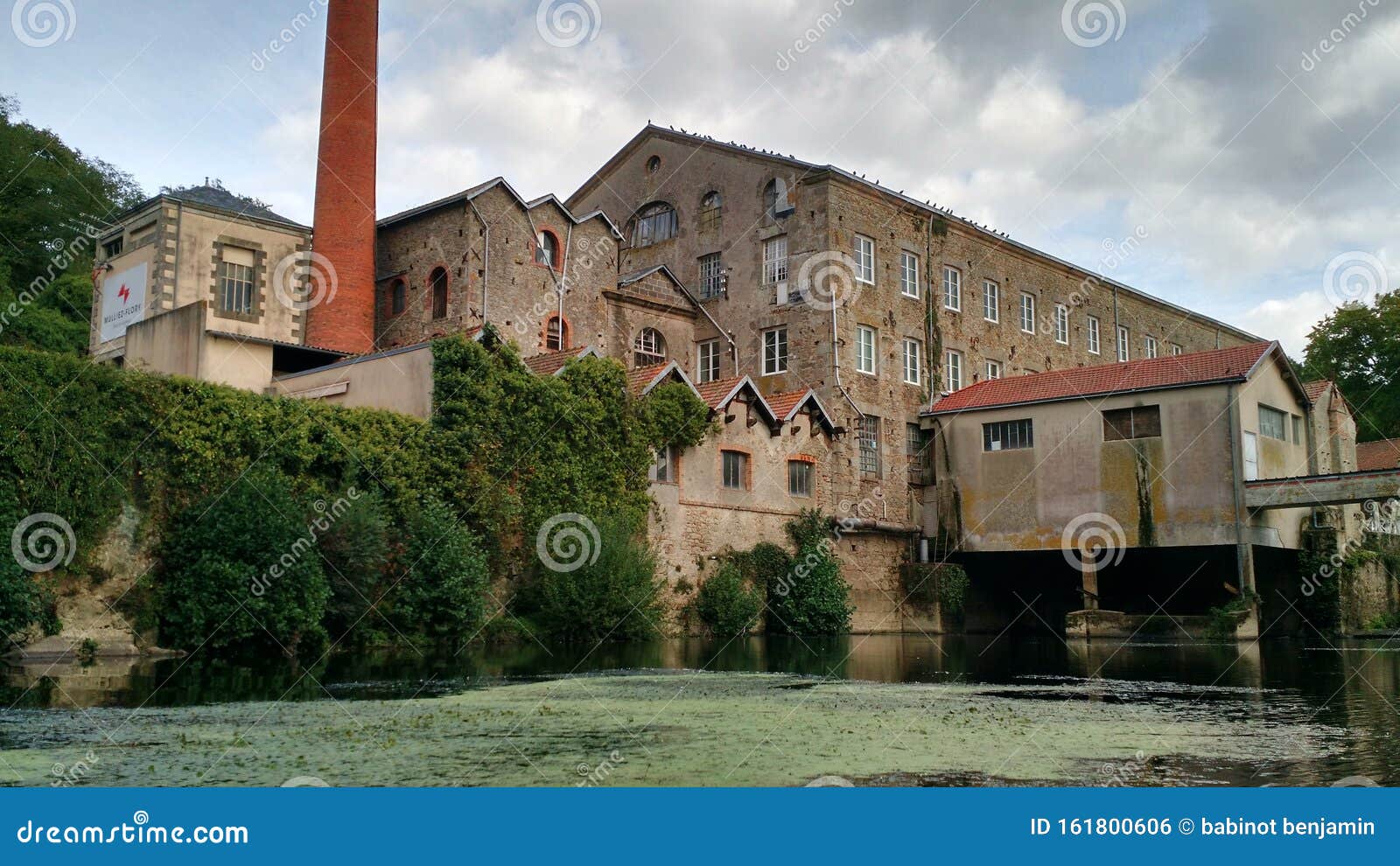 Factory on a river stock photo. Image of castle, industry - 161800606