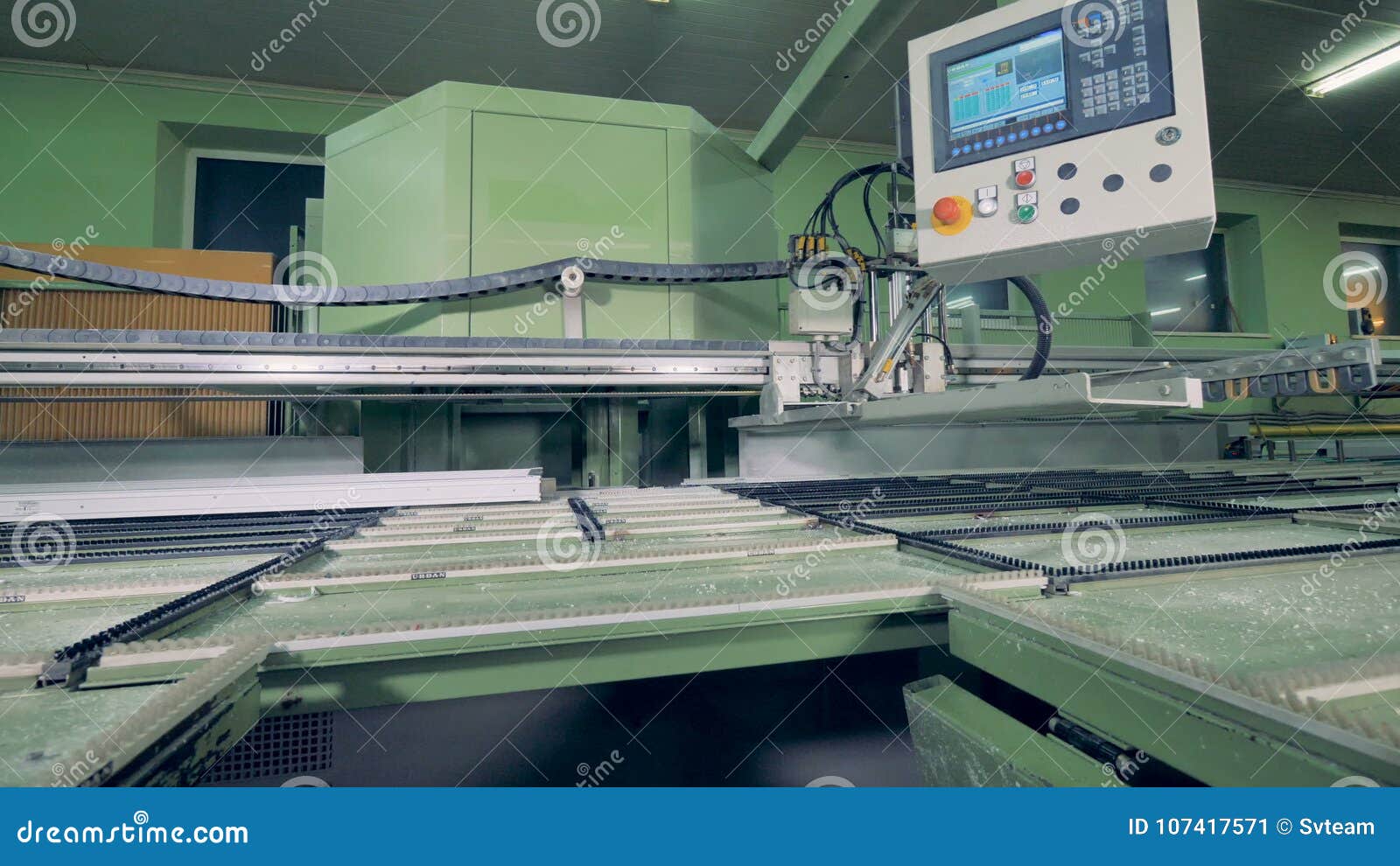 A CNC Machine with a Display for Controlling Window Frame Assembly ...