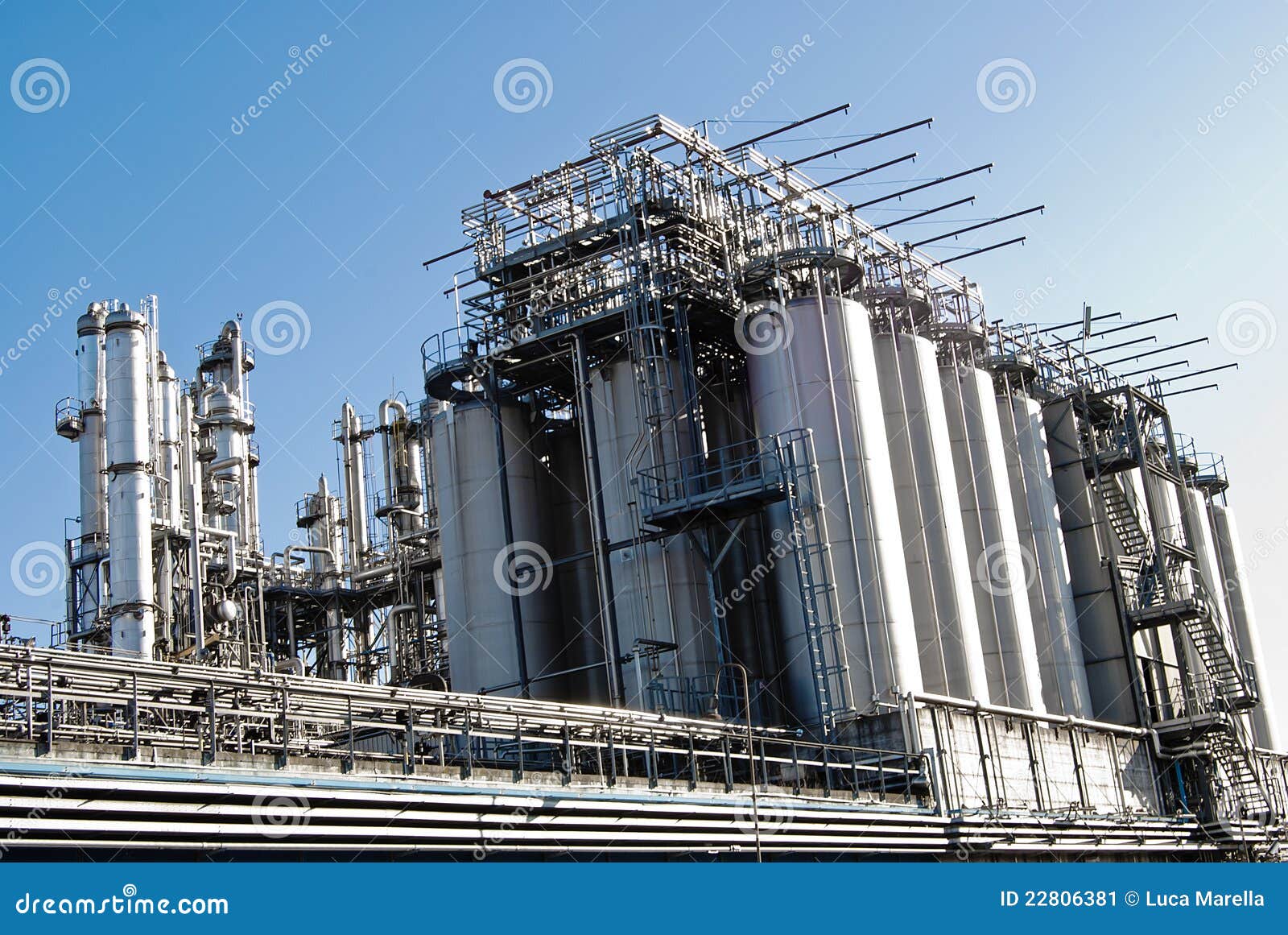 Factory silos and pipes stock image. Image of mechanized - 22806381