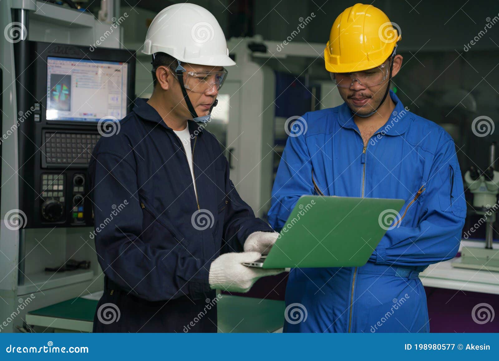 Factory Technician, Foreman and Workers in Technical Discussion Stock ...