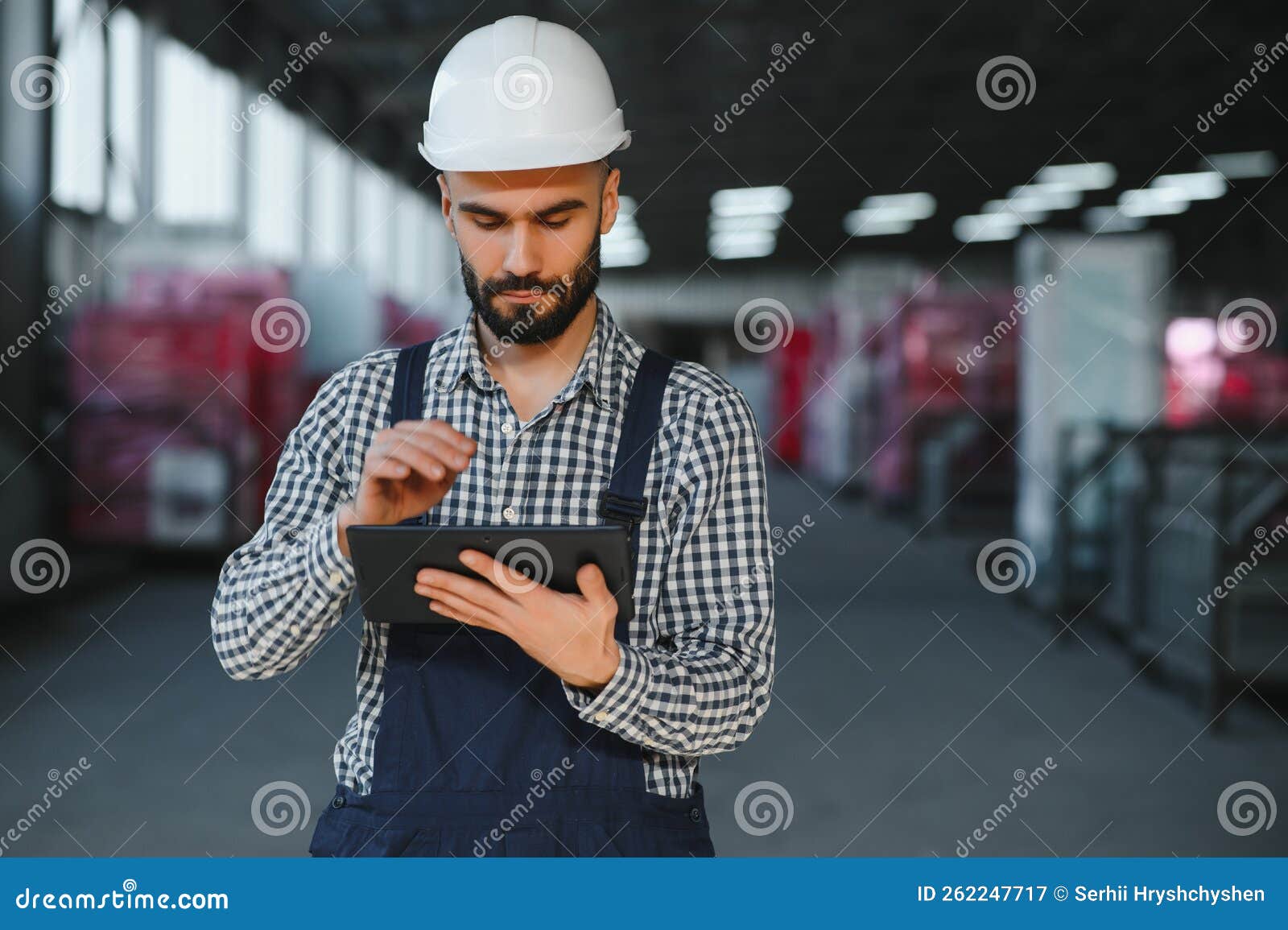 Factory Technician Working Using Digital Tablet at Factory Warehouse ...