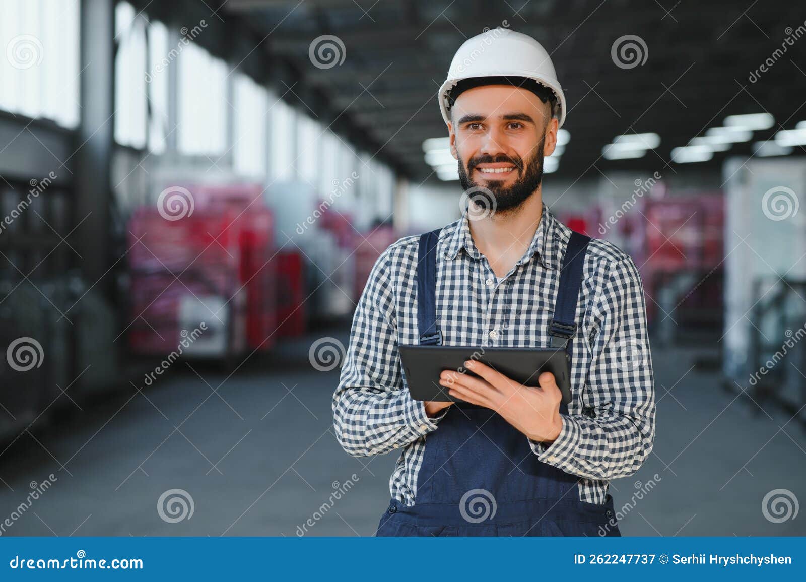 Factory Technician Working Using Digital Tablet at Factory Warehouse ...