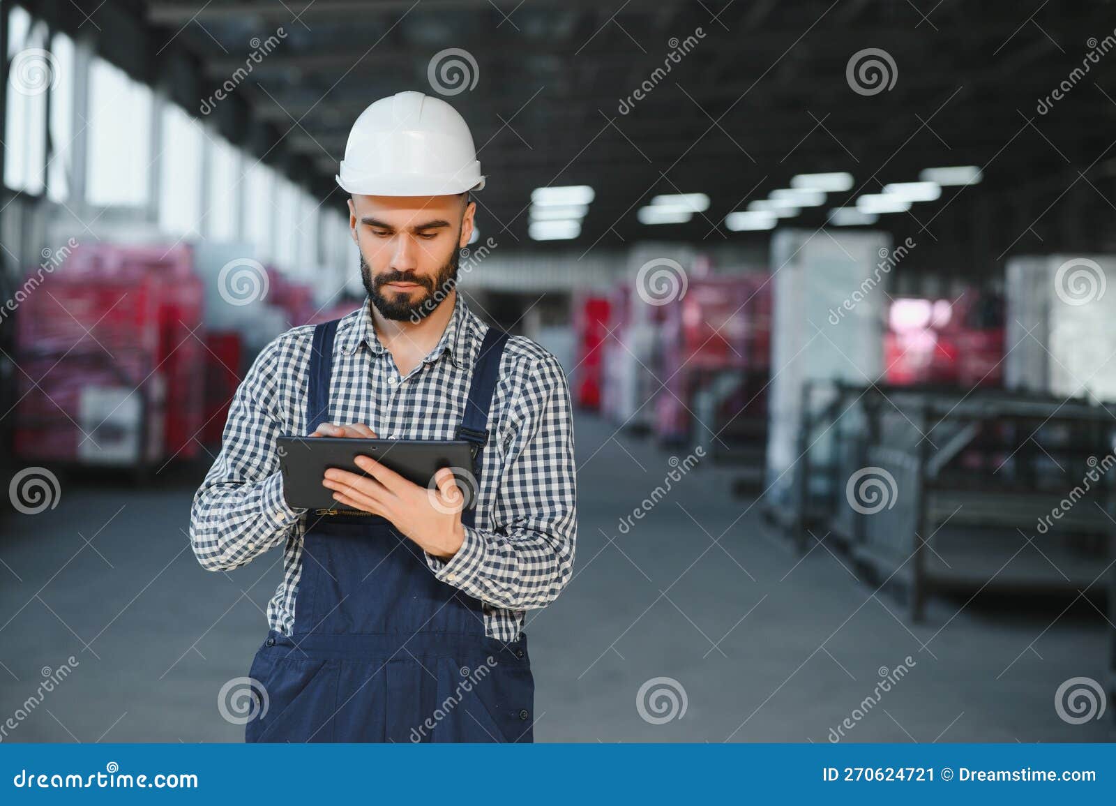Factory Technician Working Using Digital Tablet at Factory Warehouse ...