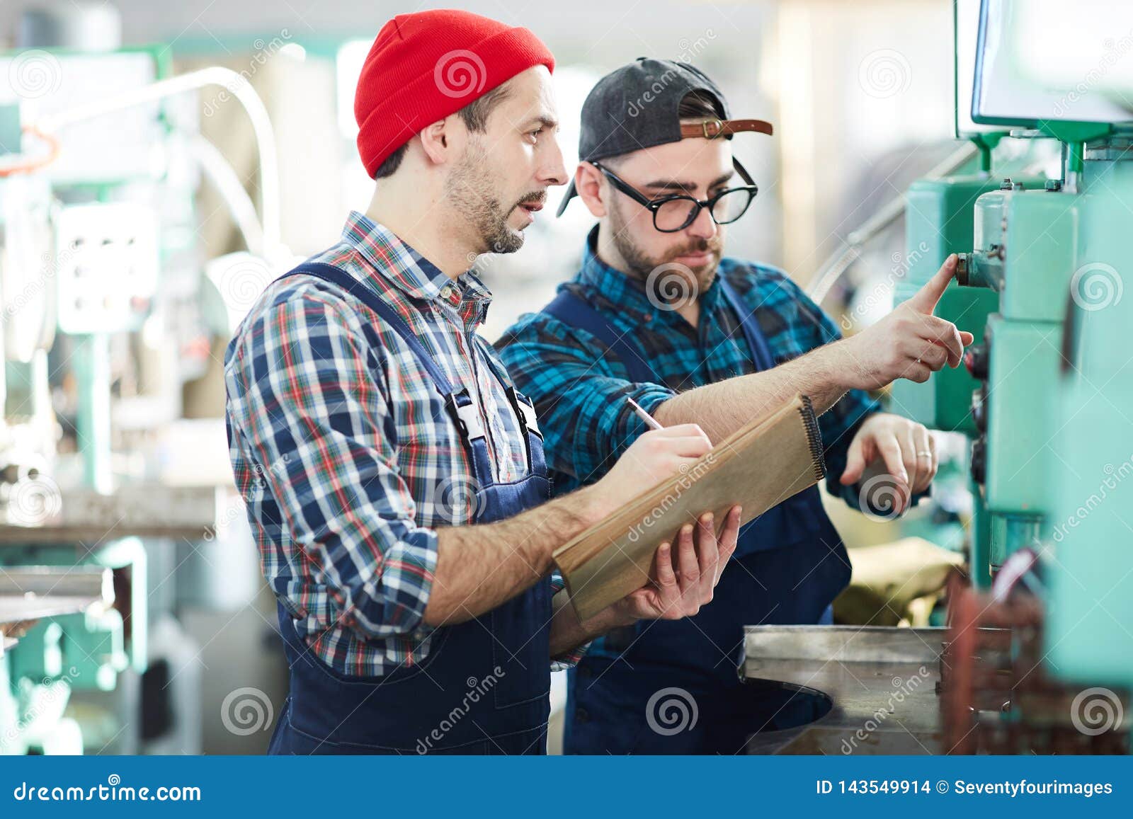 Factory Training stock photo. Image of overalls, people - 143549914
