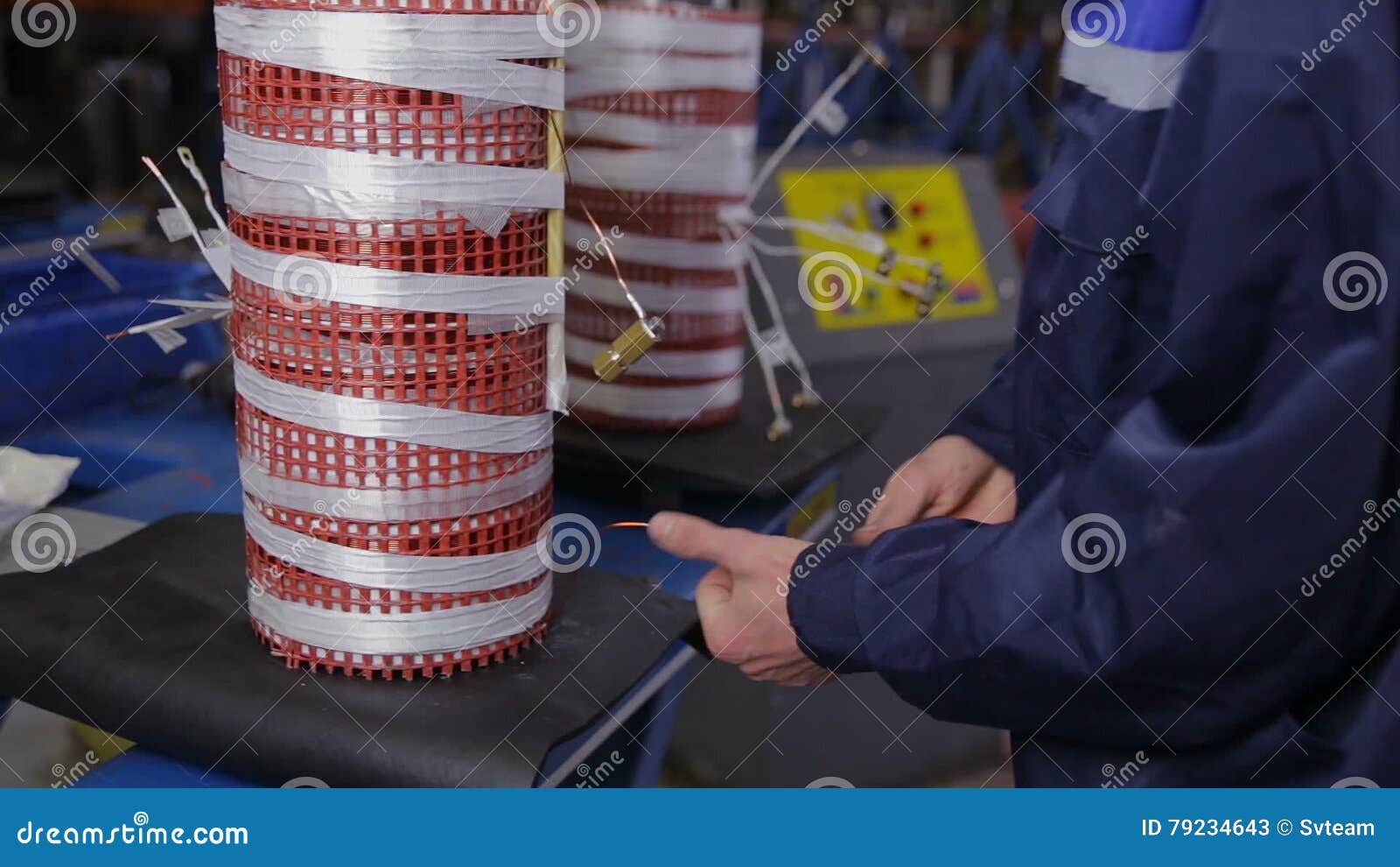 Factory Worker Assembling Electric Equipment - Transformer - on ...