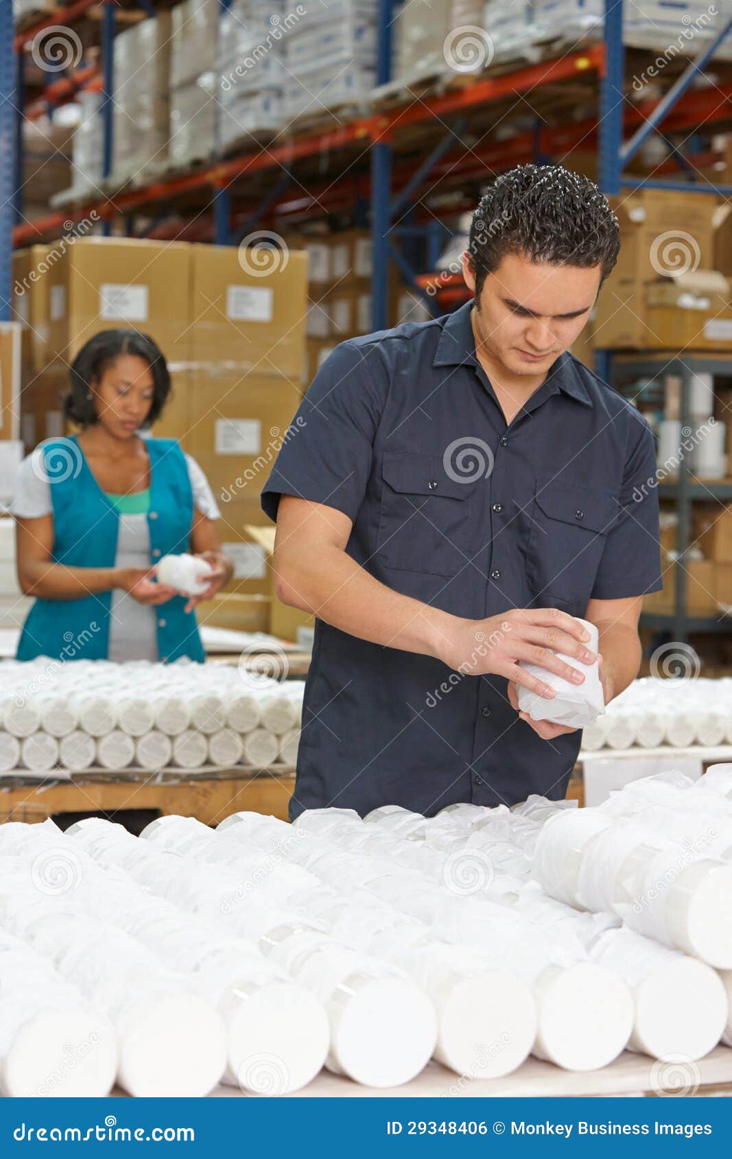 Factory Worker Checking Goods on Production Line Stock Photo - Image of ...