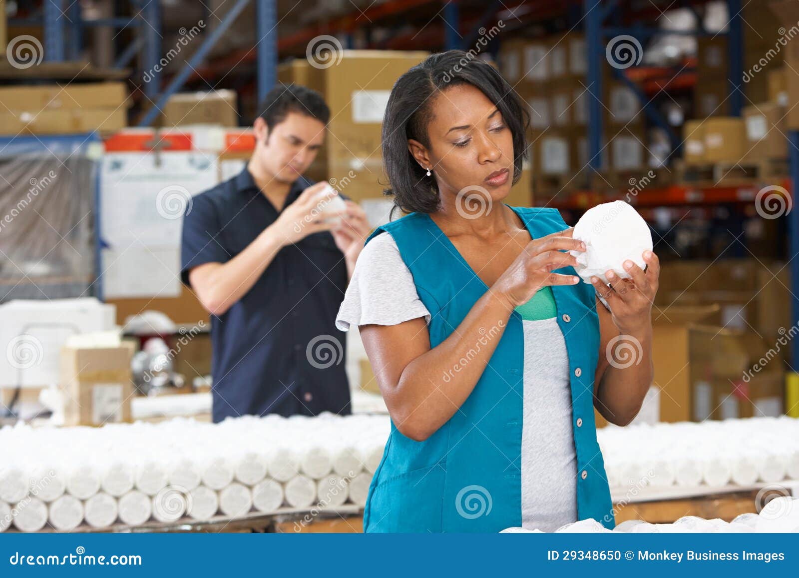 Factory Worker Checking Goods on Production Line Stock Photo - Image of ...