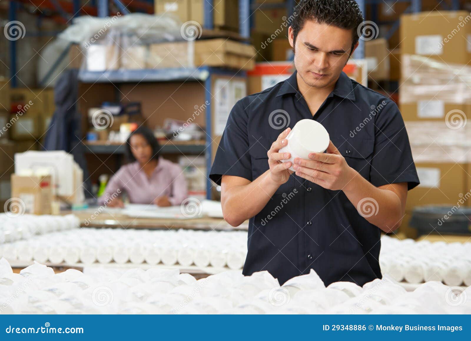 Factory Worker Checking Goods on Production Line Stock Photo - Image of ...