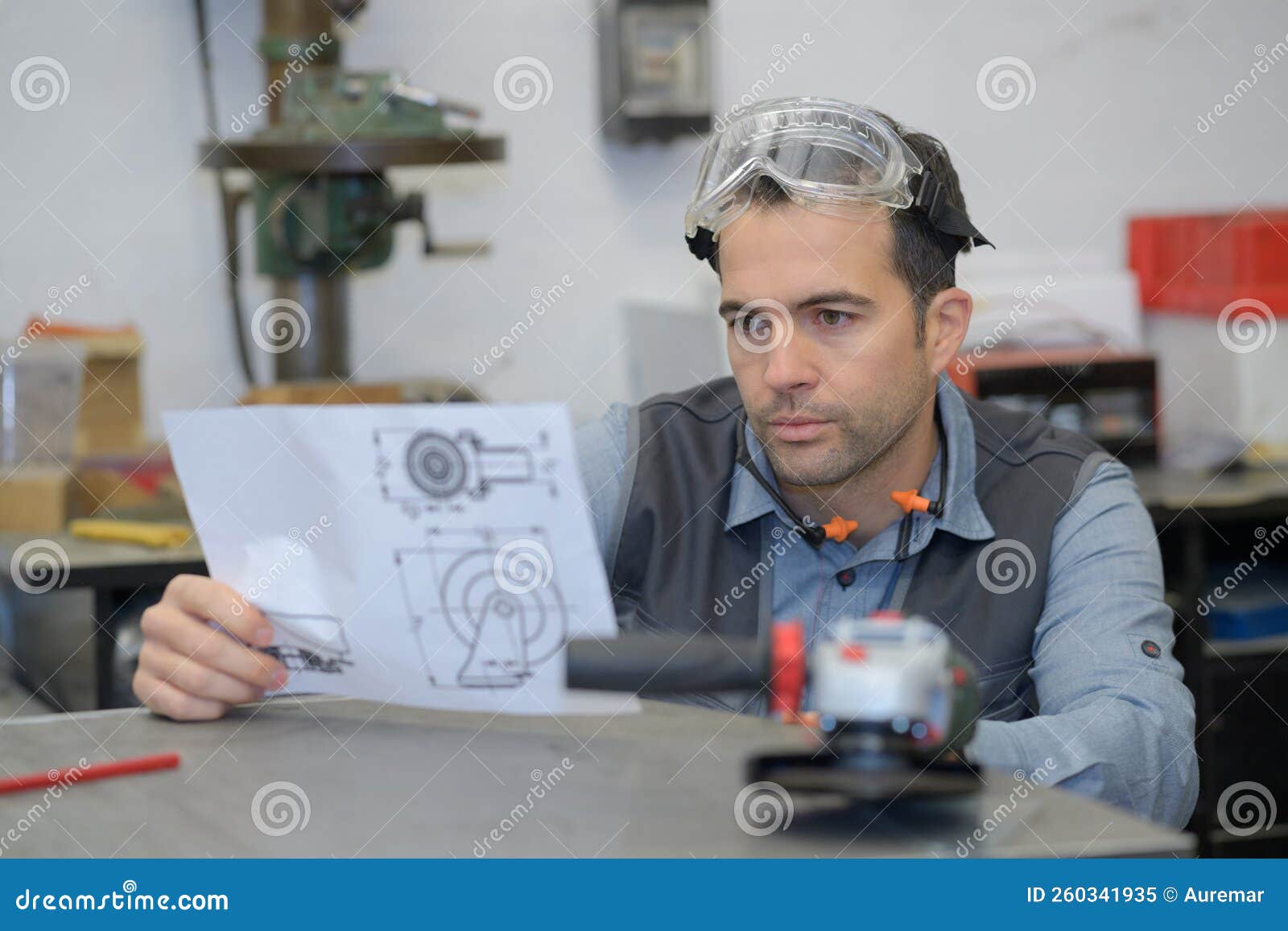 Factory Worker Checking Instructions before Stock Image - Image of ...
