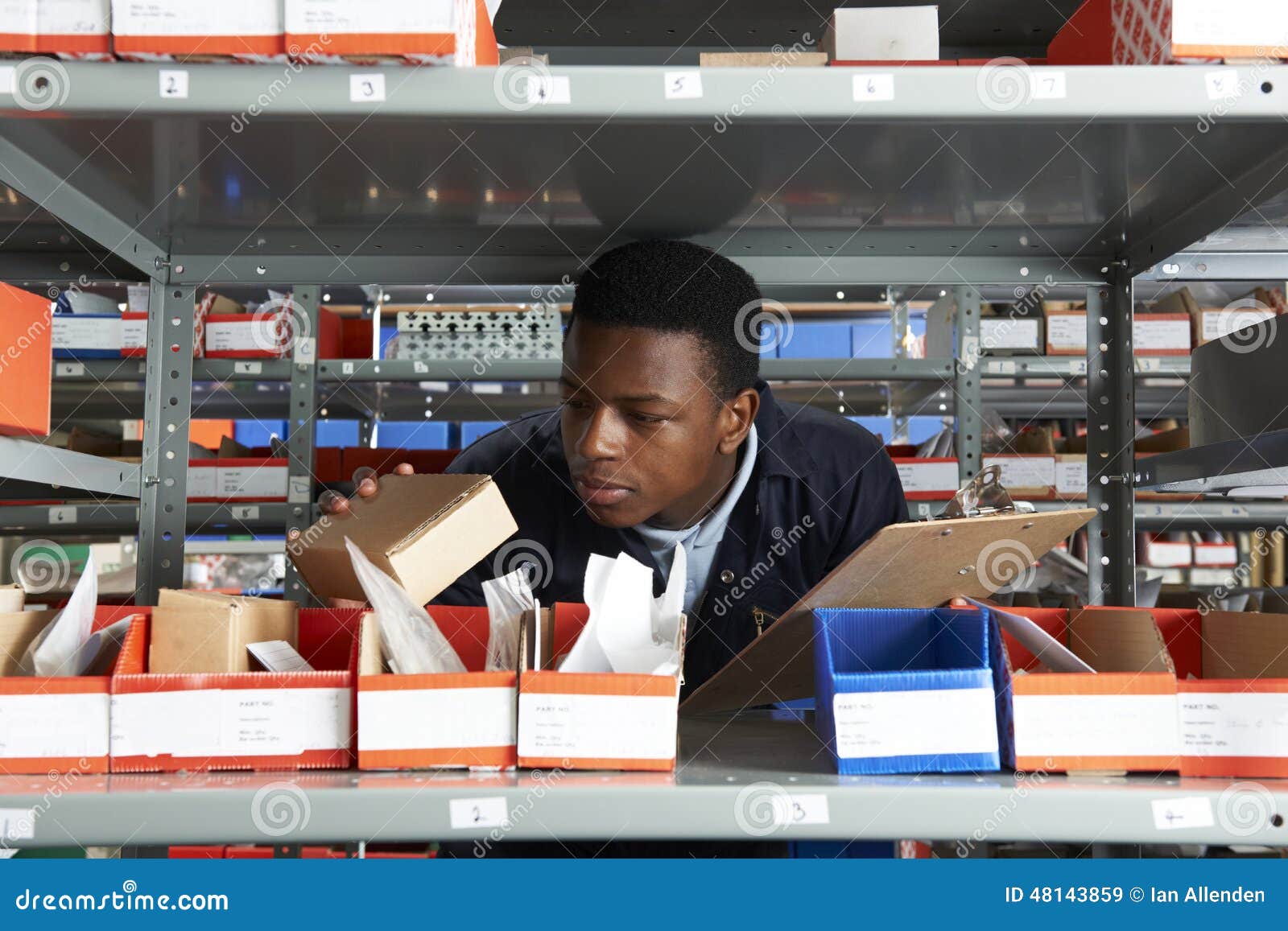 Factory Worker with Clipboard in Storeroom Stock Image - Image of ...