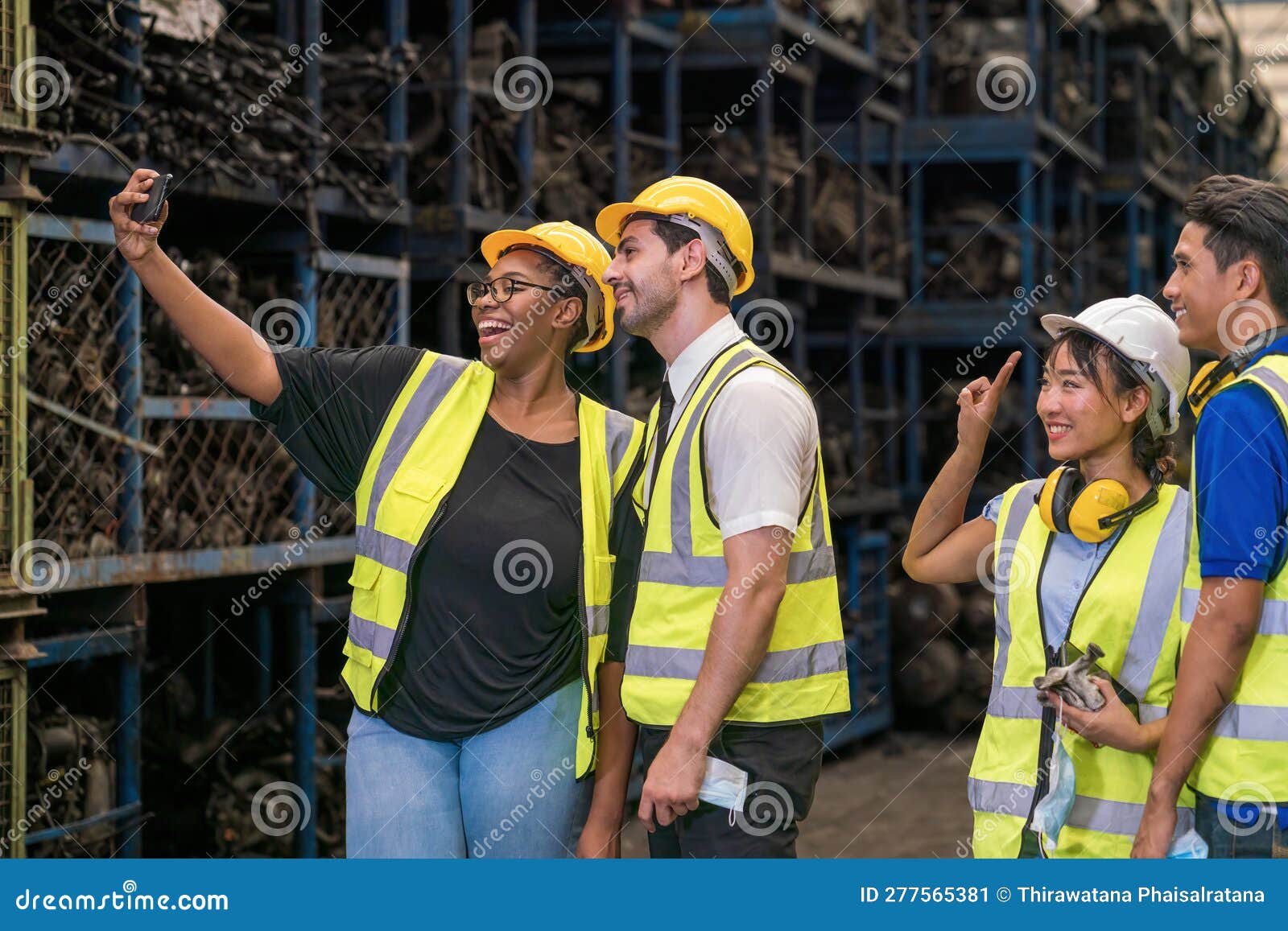 Factory Worker and Engineer As Team. Group of Industrial Staff Taking a ...