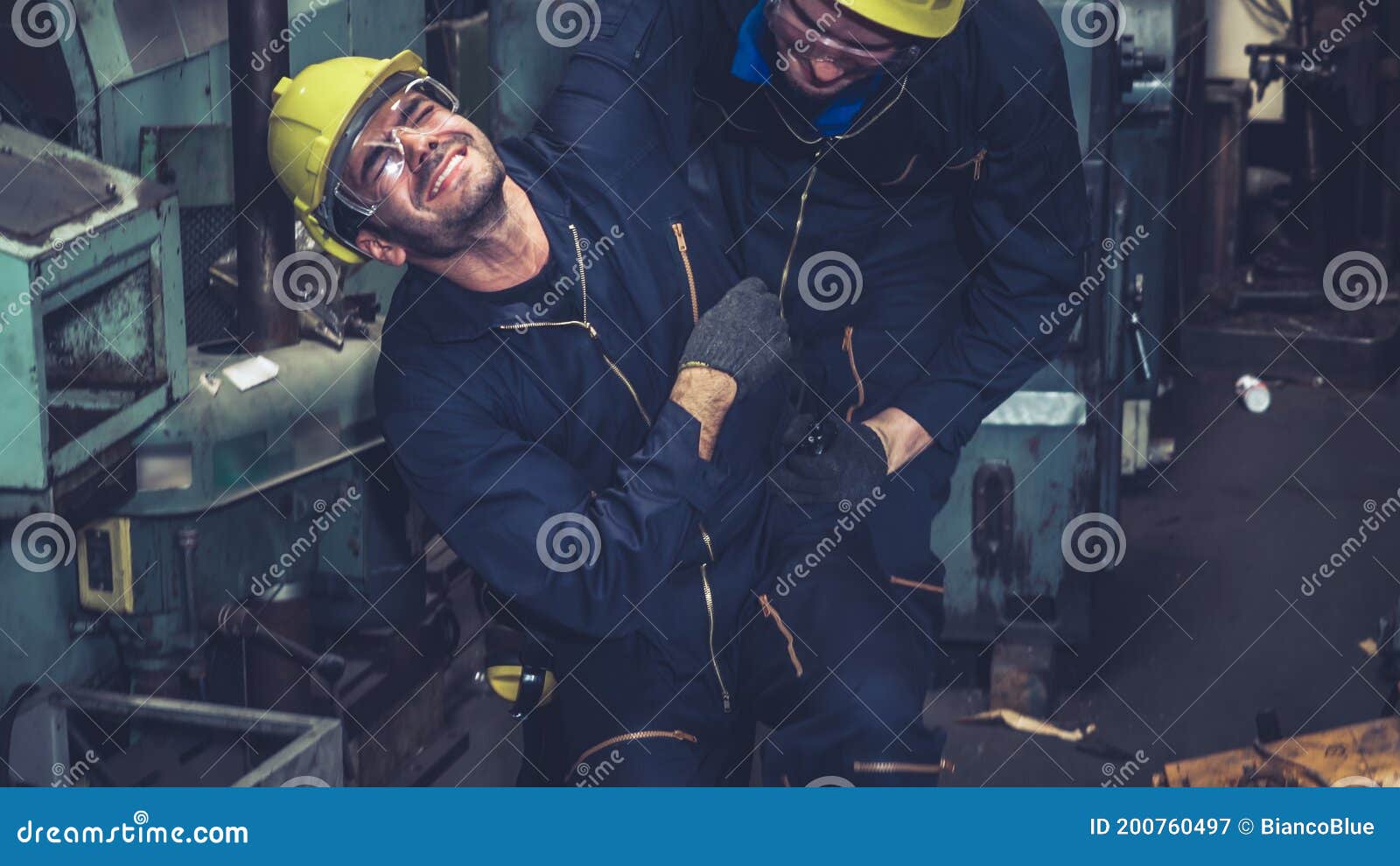 Factory Worker Injured by Accident while Using Machine in Factory Stock ...