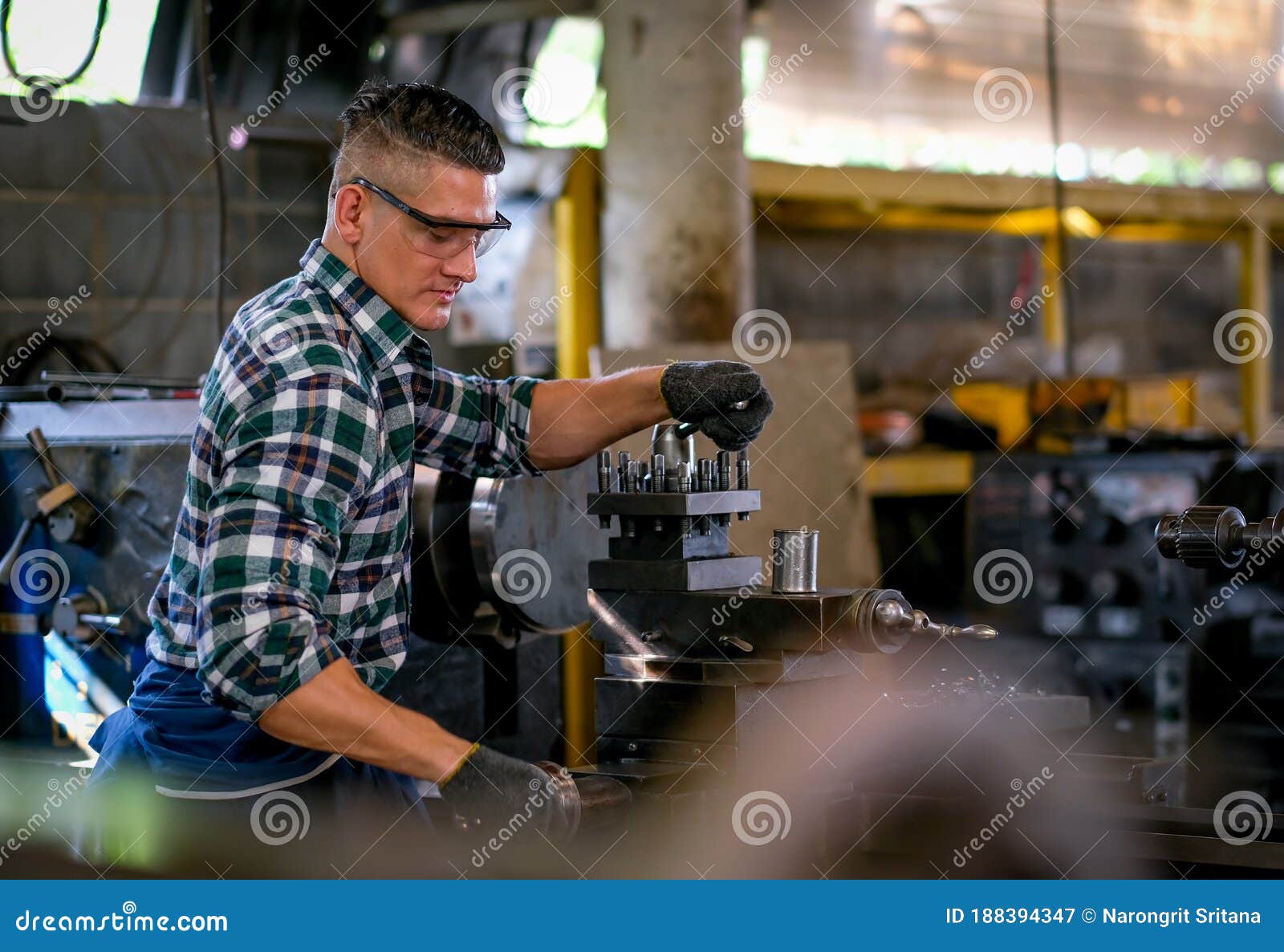 Factory Worker Man Work with the Machine and Look Attractive with ...
