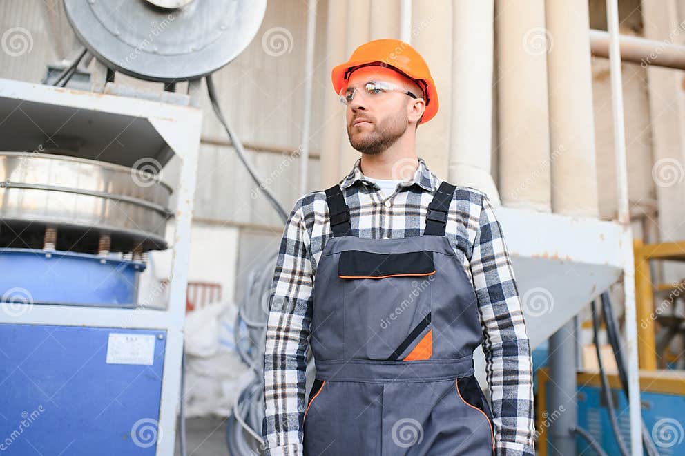 Factory Worker. Man Working on the Production Line Stock Photo - Image ...