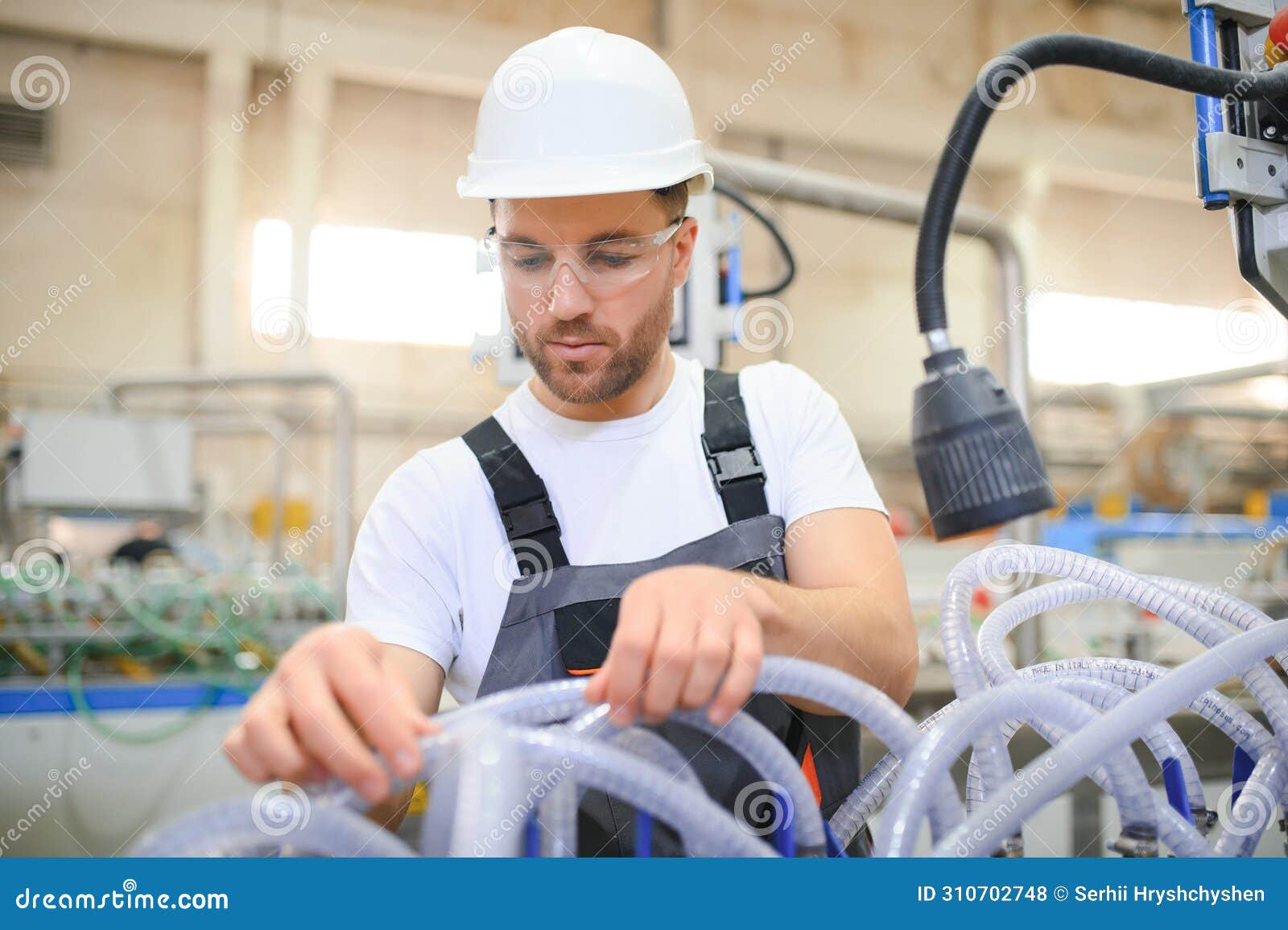 Factory Worker. Man Working on the Production Line Stock Photo - Image ...