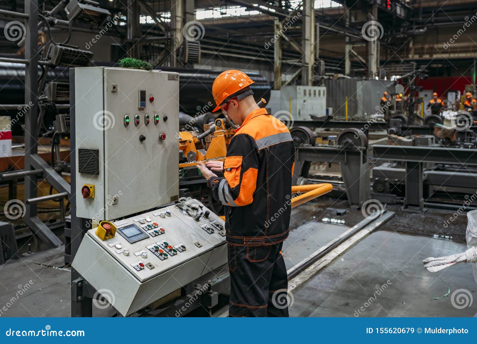 Operator Working with CNC Machine in Metalworking Workshop Editorial ... Operator Working with CNC Machine in Metalworking Workshop Editorial ...