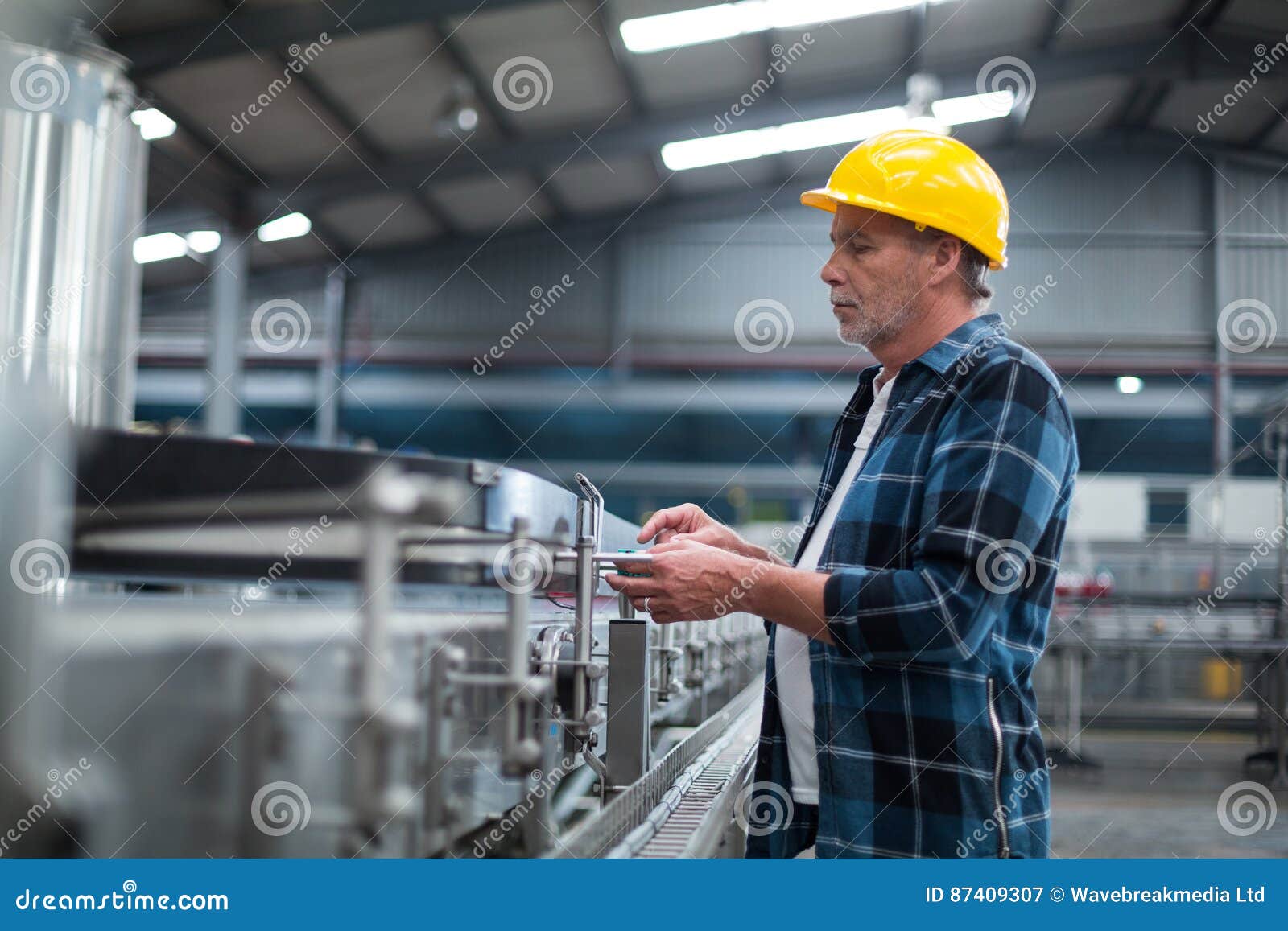 Factory Worker Monitoring Production Line Stock Image - Image of ...