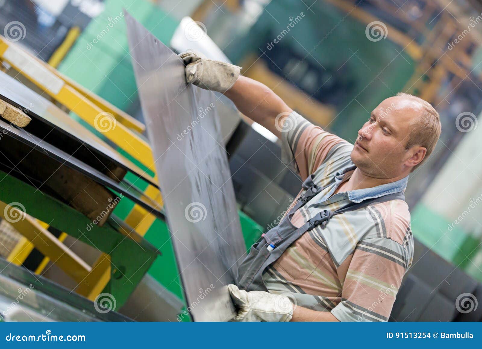 Factory Worker Moving Metal Sheet in Workshop Stock Photo - Image of ...