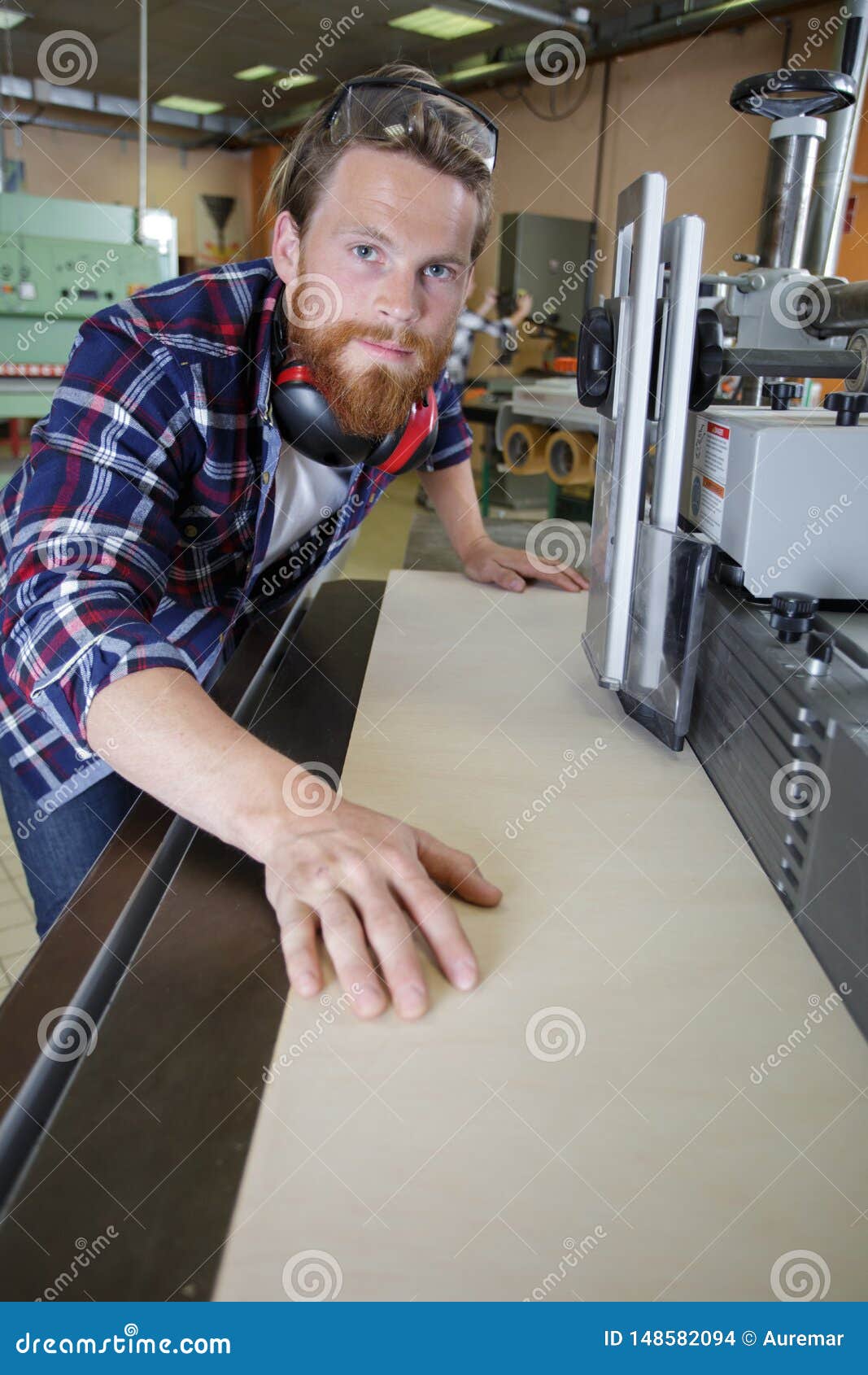 Factory Worker Operates Laser Cutting Machine in Workshop Stock Photo ...