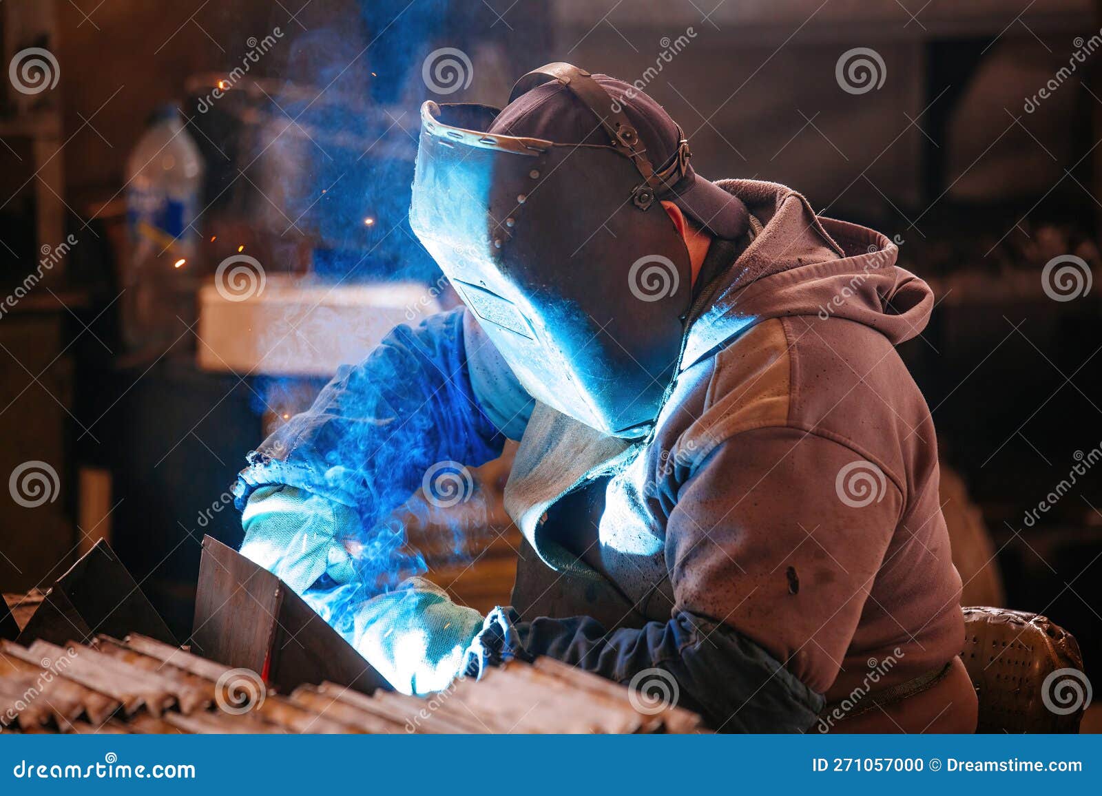 Factory Worker in Protective Mask Welding Iron Parts Stock Photo ...