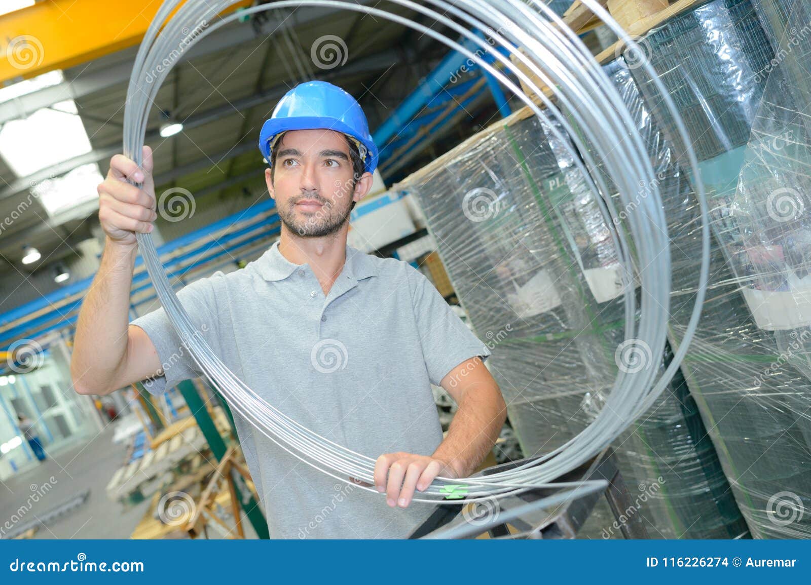 Factory Worker with Steel Wiring Stock Photo - Image of young, business ...