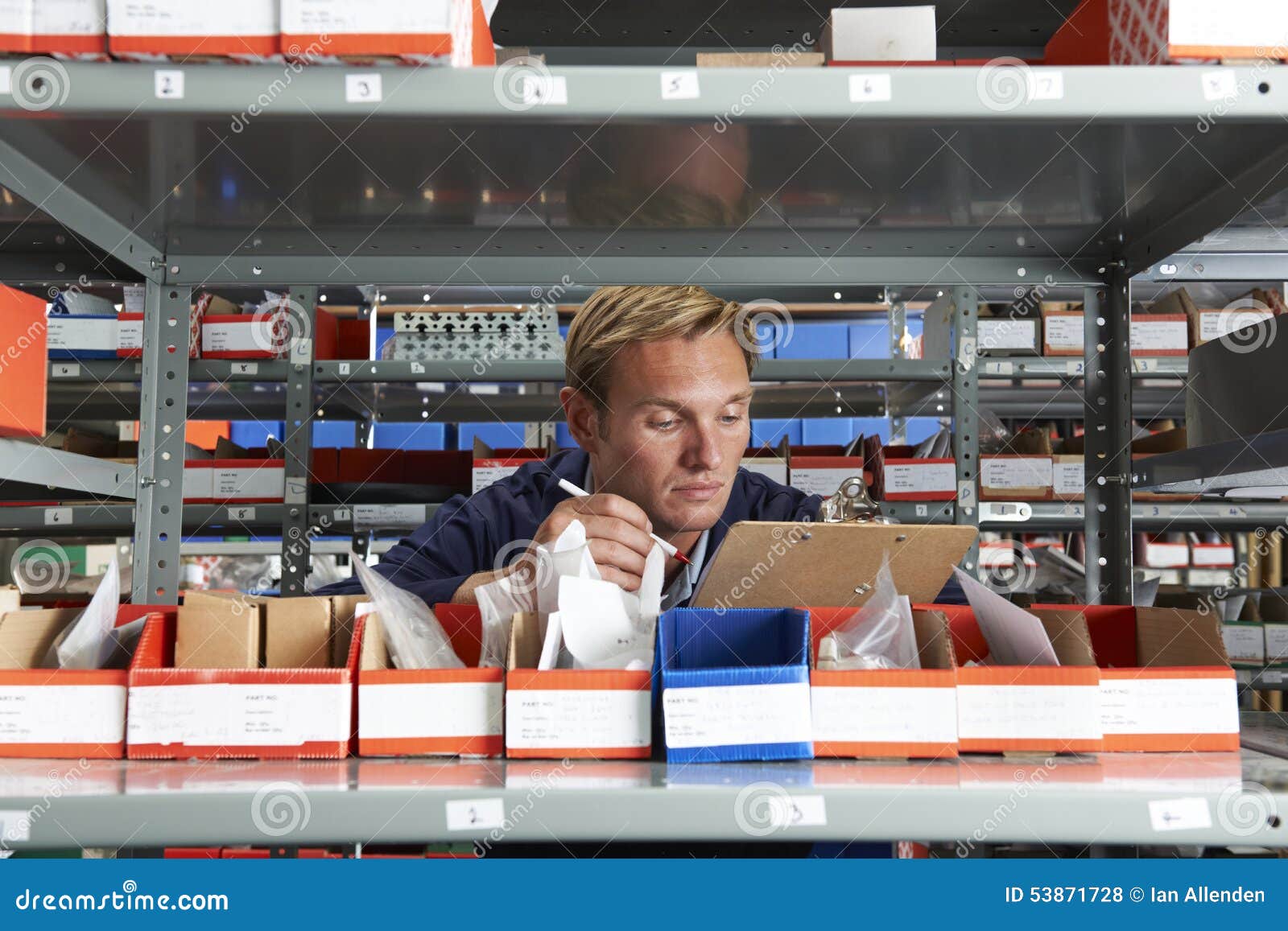 Factory Worker in Store Room Checking Stock Stock Photo - Image of ...