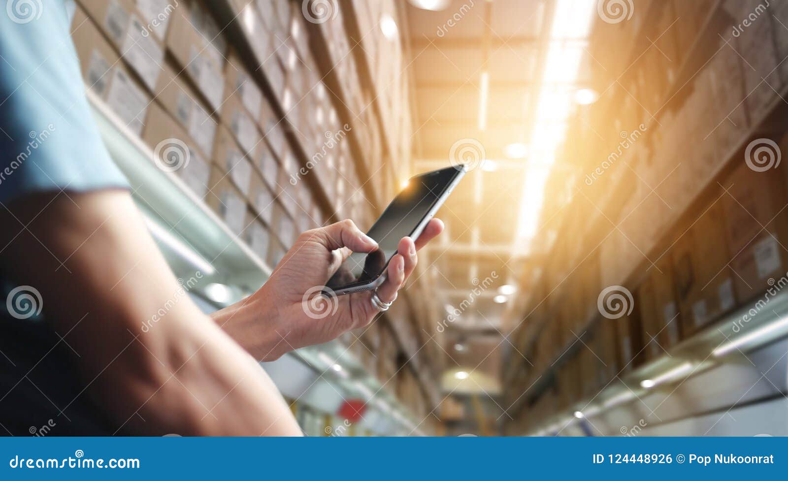 Factory Worker Using Application in Smartphone Operating Stock Photo ...