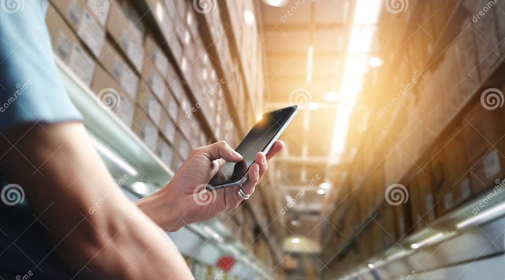 Factory Worker Using Application in Smartphone Operating Stock Photo ...