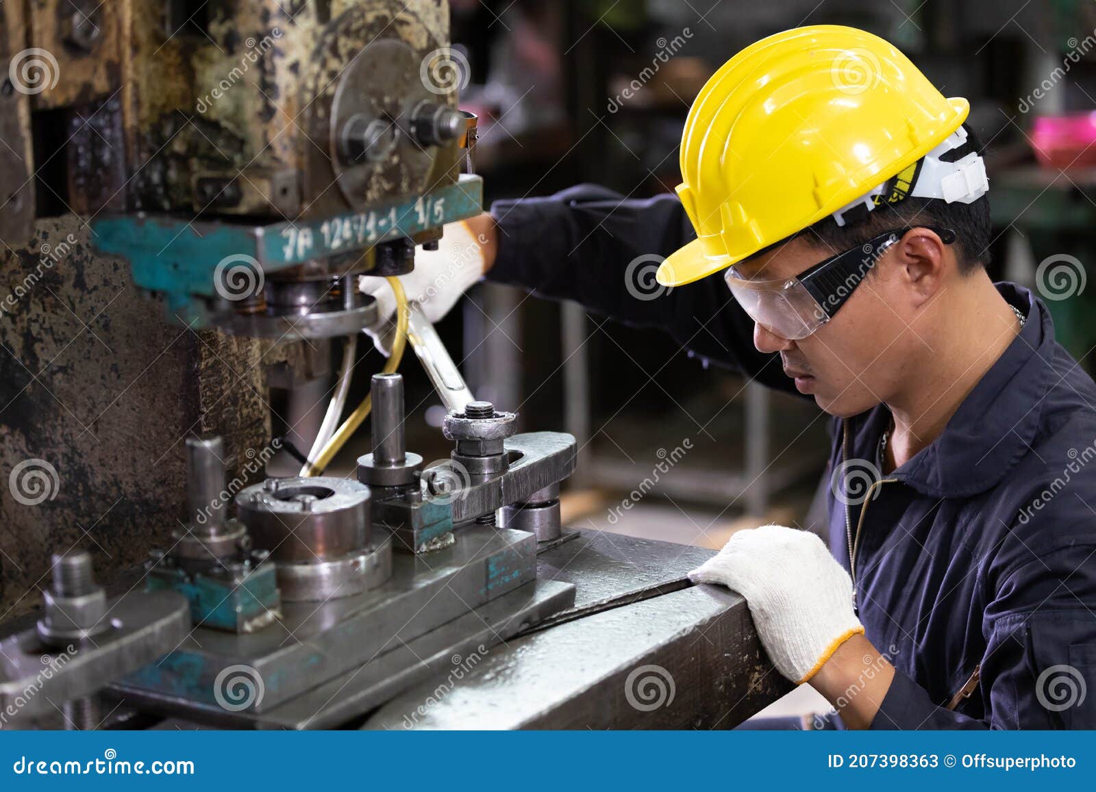 Factory Worker Using Wrench To Fix the Machine Stock Image - Image of ...