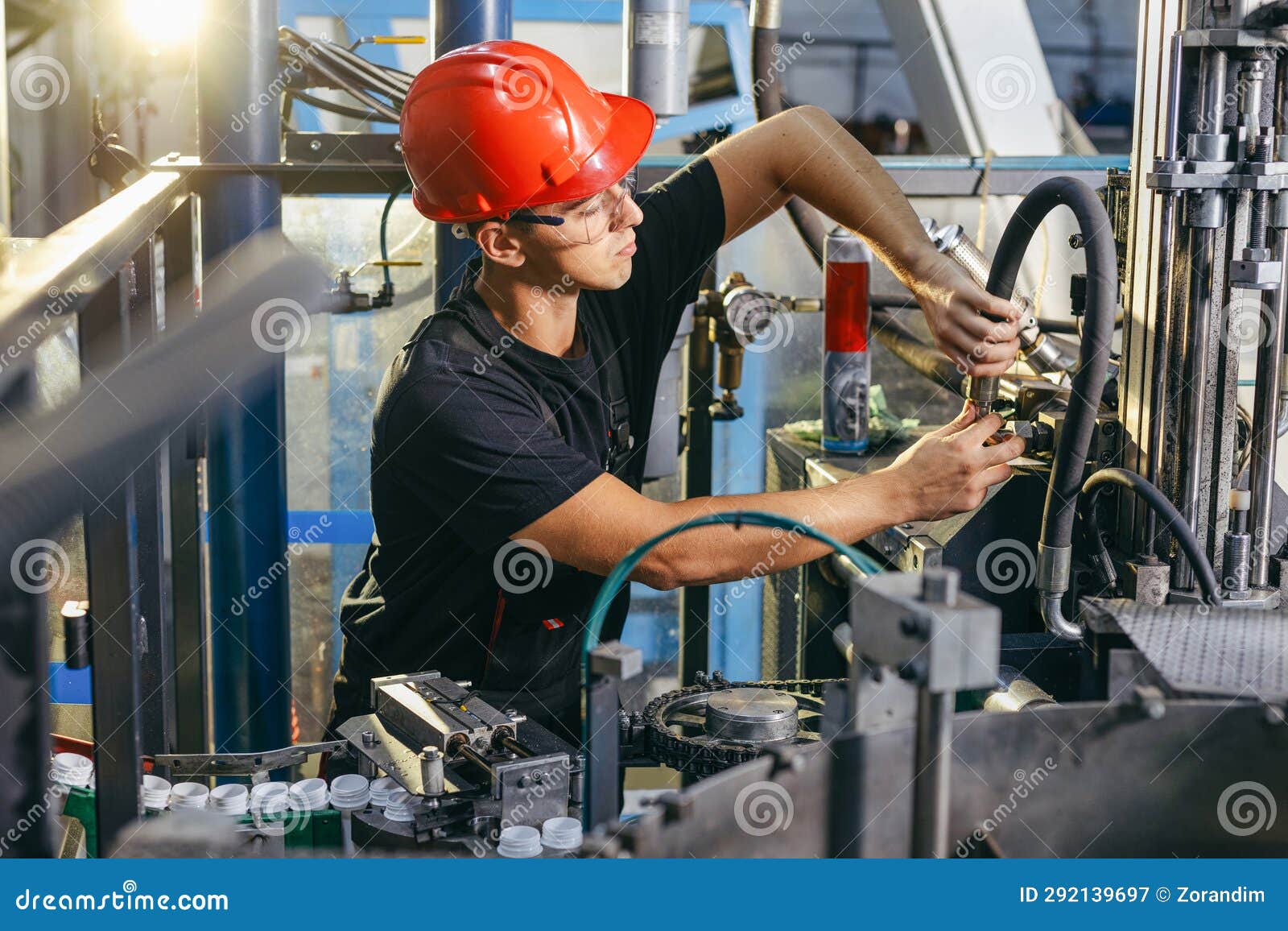 Factory Worker Working in Industrial Building Indoor. Man Fixing ...