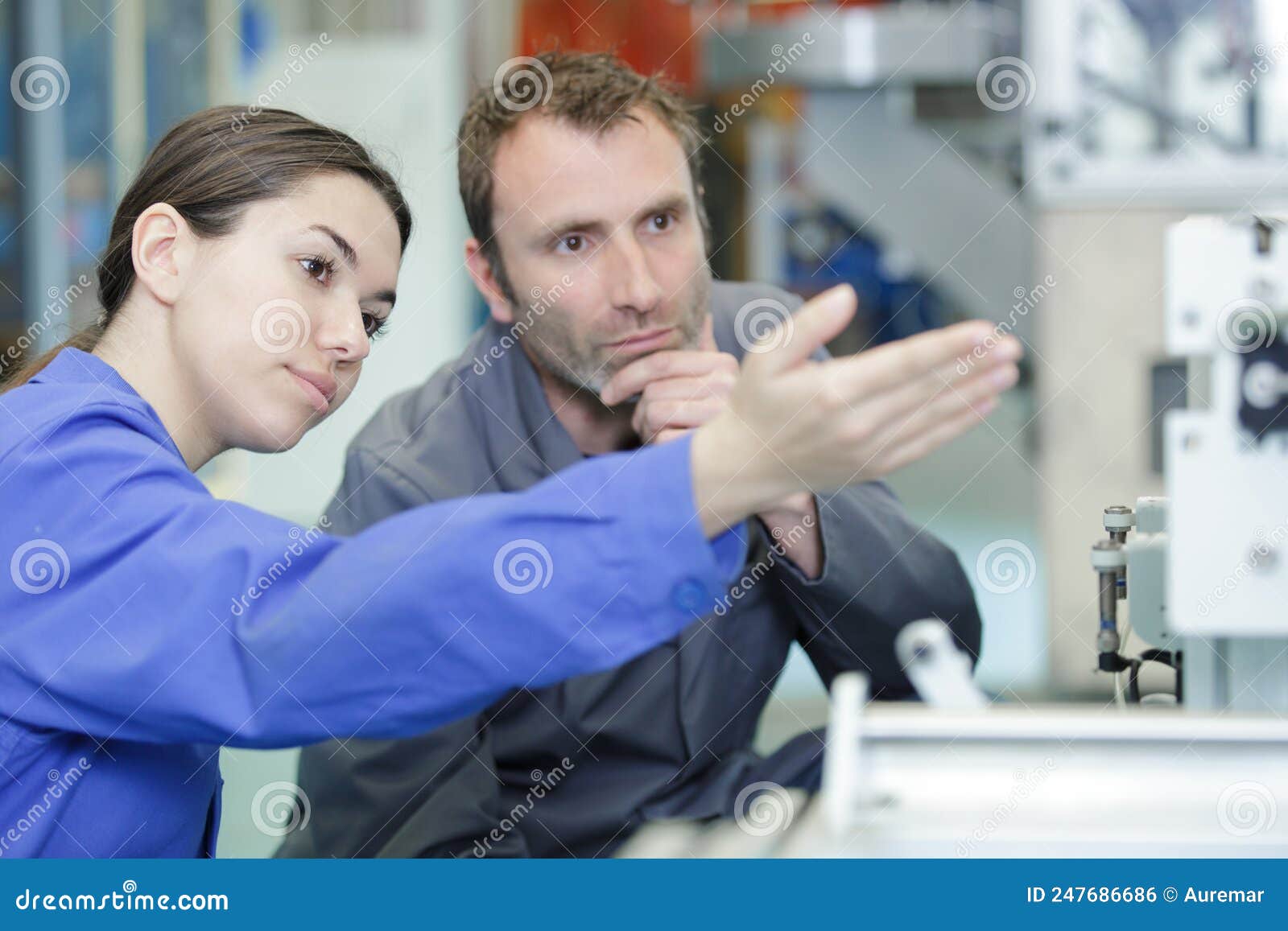 Factory Workers Checking Goods on Production Line Stock Photo - Image ...