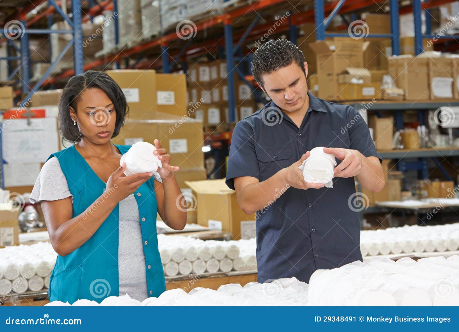 Factory Workers Checking Goods on Production Line Stock Image - Image ...