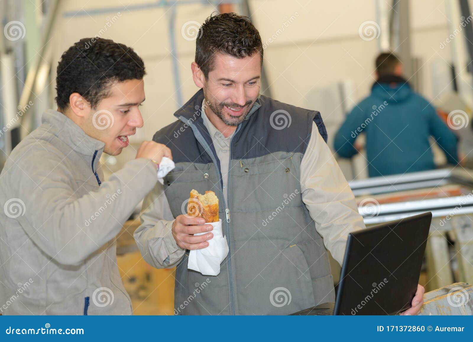 Factory Workers Eating Bread for Snack Stock Photo - Image of ...
