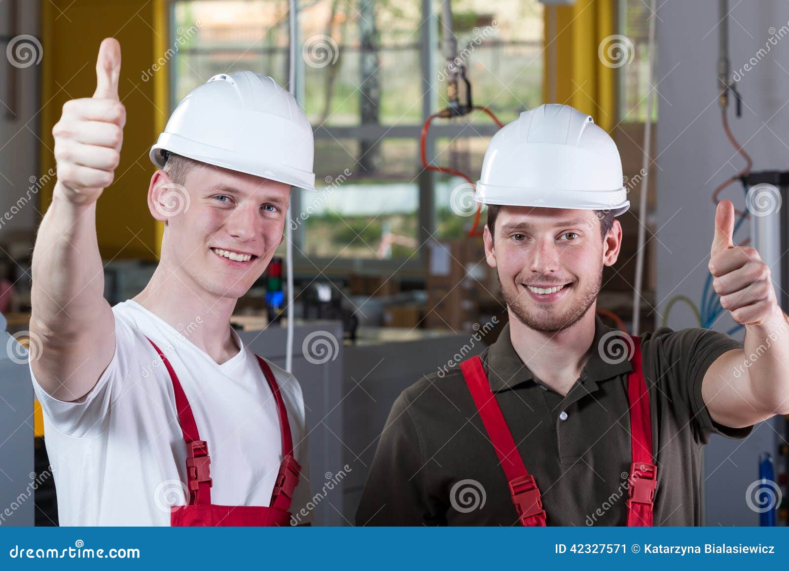 Factory Workers Giving Thumbs Up Sign Stock Image - Image of production ...