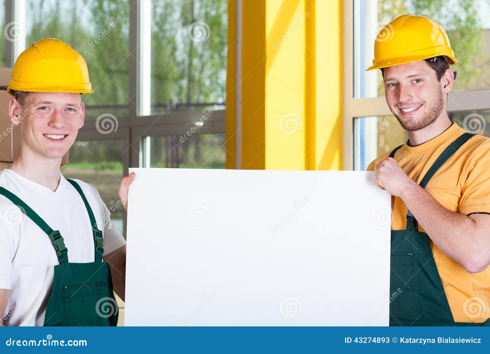 Factory Workers Holding a White Board Stock Image - Image of overalls ...