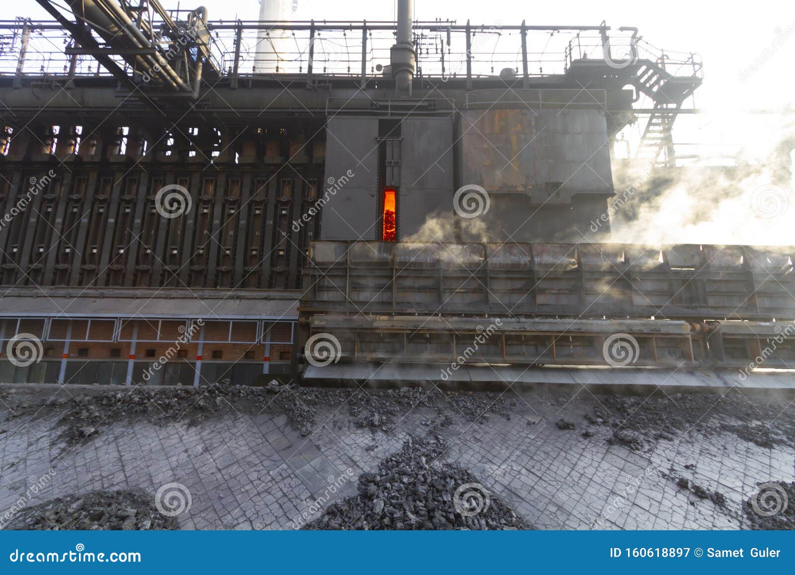 Iron and Steel Producing Factory and Workers Working. Stock Image ...