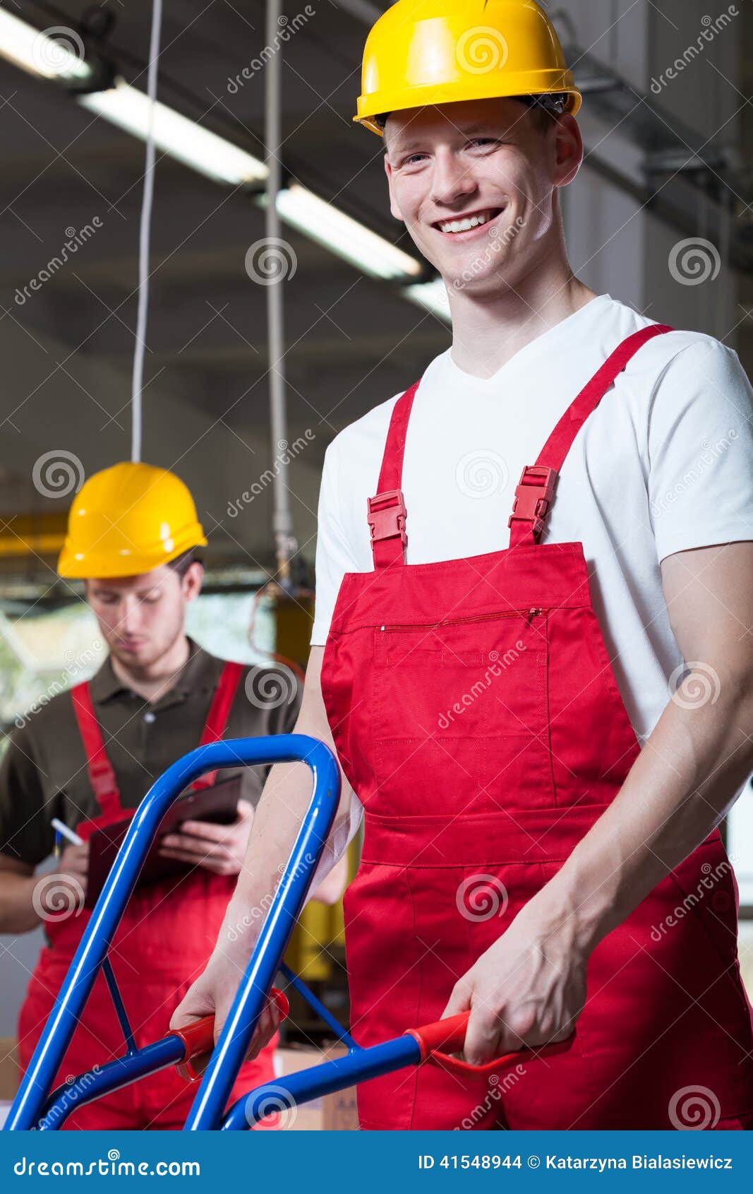 Factory Workers Pushing a Manual Trolley Stock Photo - Image of adult ...