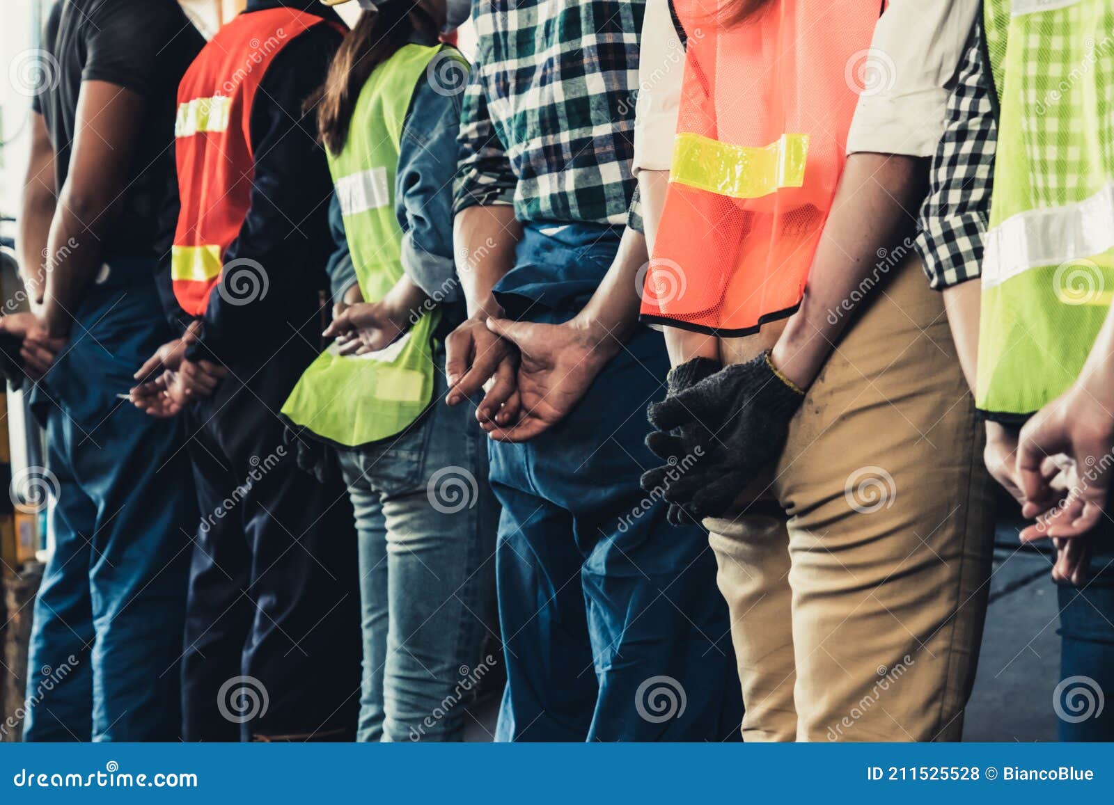 Factory Workers Standing in a Row Showing Teamwork and Unity. Stock ...