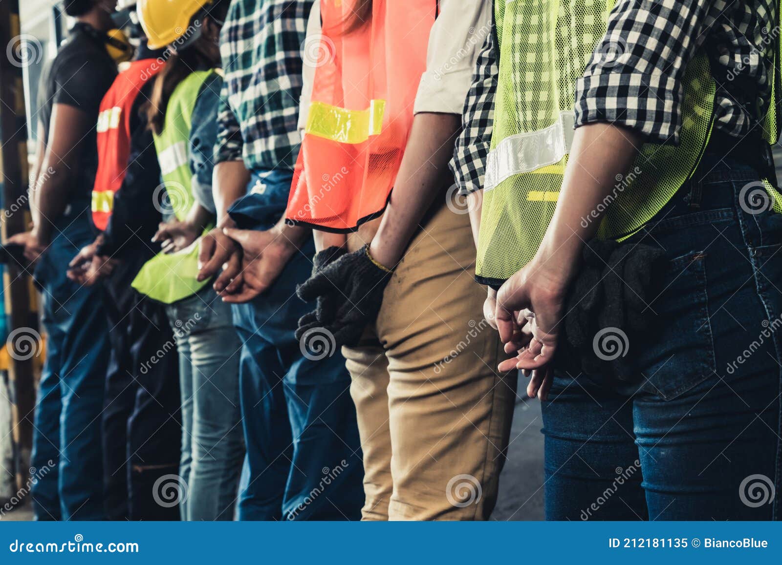 Factory Workers Standing in a Row Showing Teamwork and Unity. Stock ...